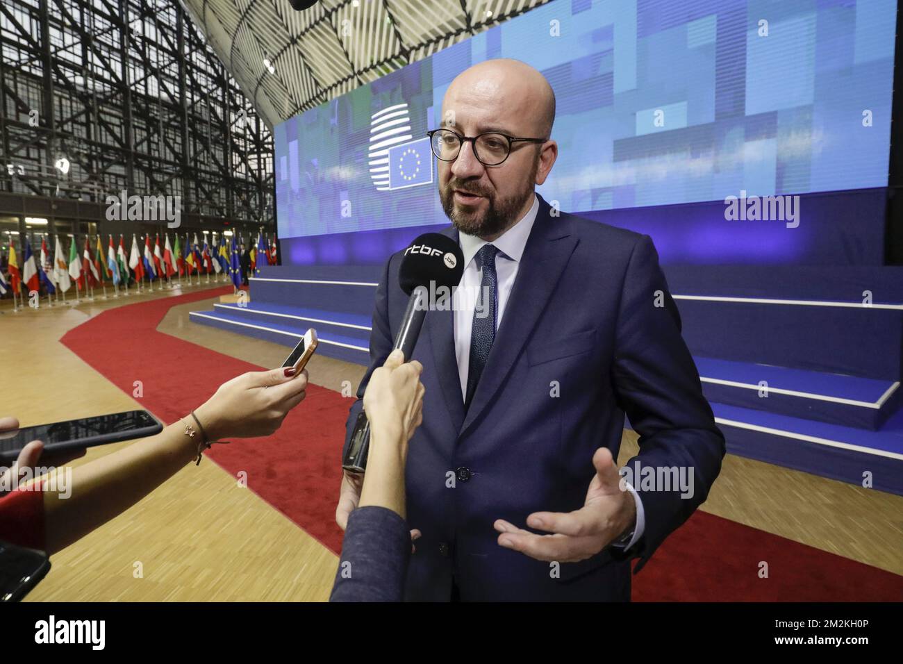 Belgian Prime Minister Charles Michel arrives on the first day of the ...