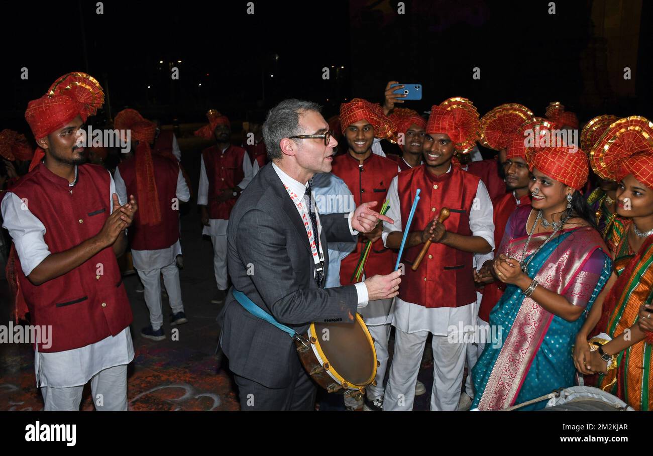 Mumbai, India. 13th Dec, 2022. A foreign delegate interacts with local ...