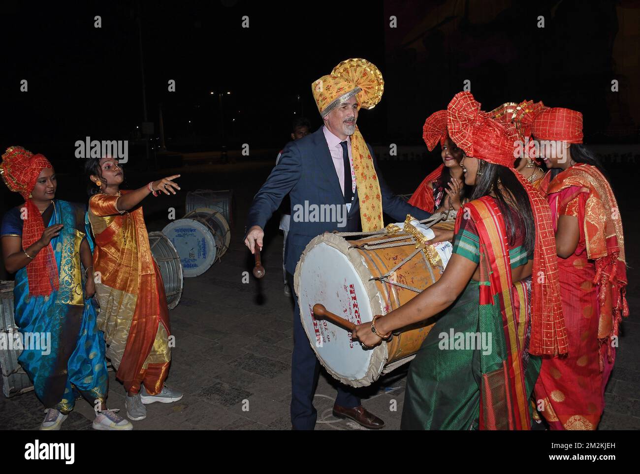 Mumbai, India. 13th Dec, 2022. A foreign delegate wearing a traditional ...