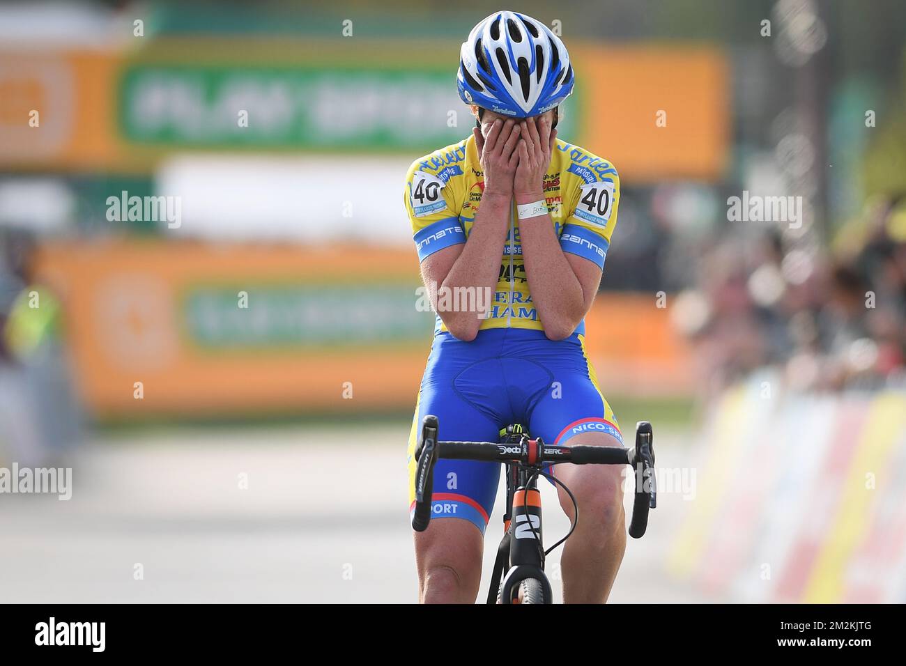 Belgian Kim Van De Steene celebrates as she crosses the finish line to ...