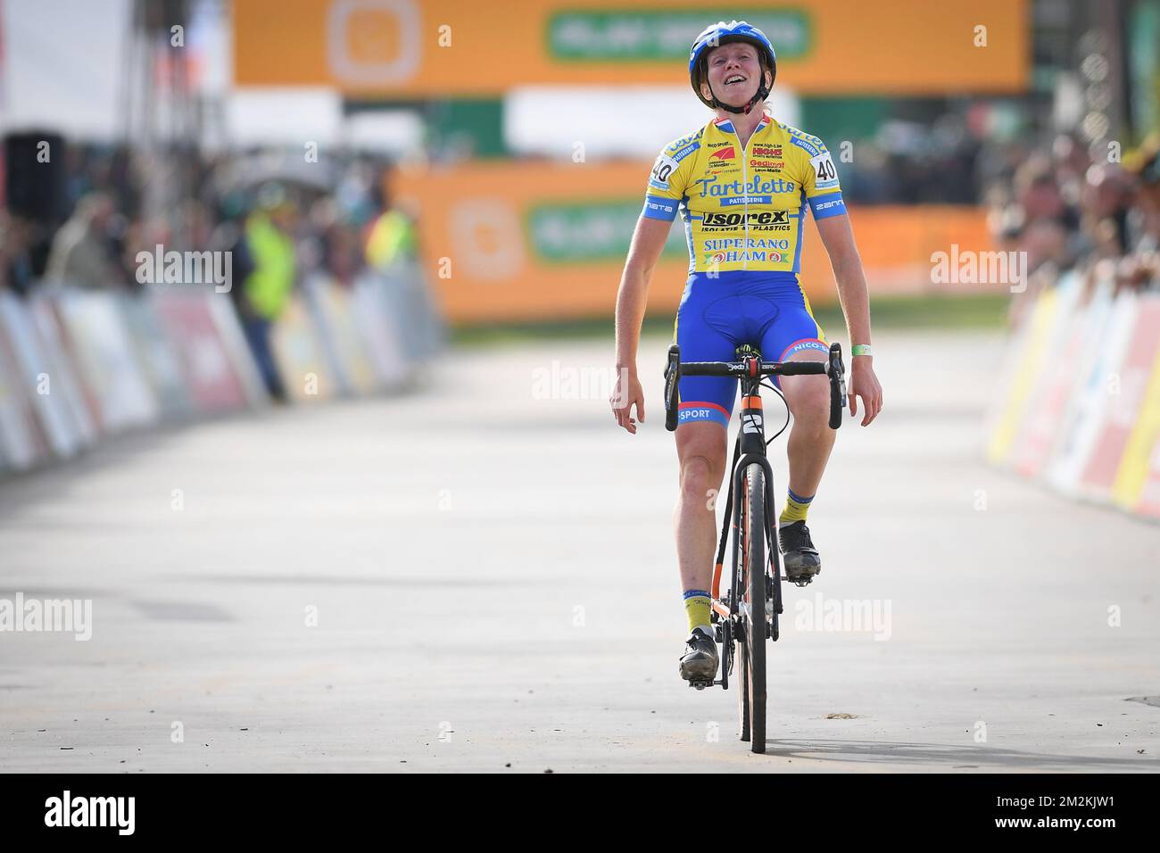 Belgian Kim Van De Steene celebrates as she crosses the finish line to ...