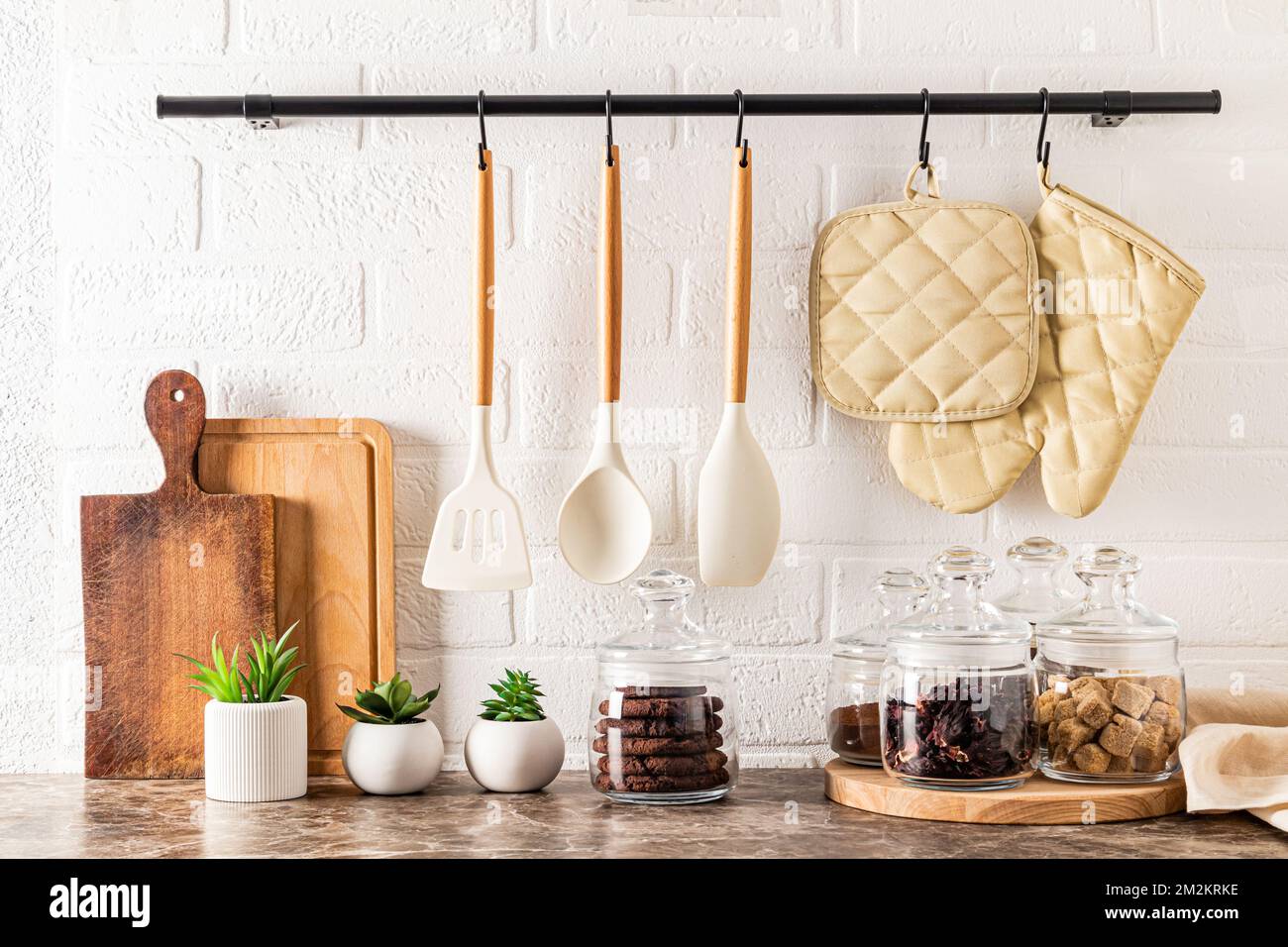 beautiful storage area on a modern kitchen countertop. various glass ...