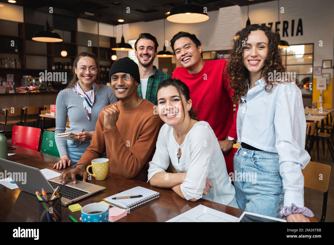 Young and succesfull mixed race people looking at camera. Teamwork or ...