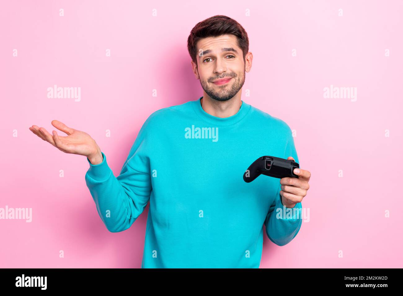 Photo portrait of nice young guy shrug shoulder dont care playstation ...