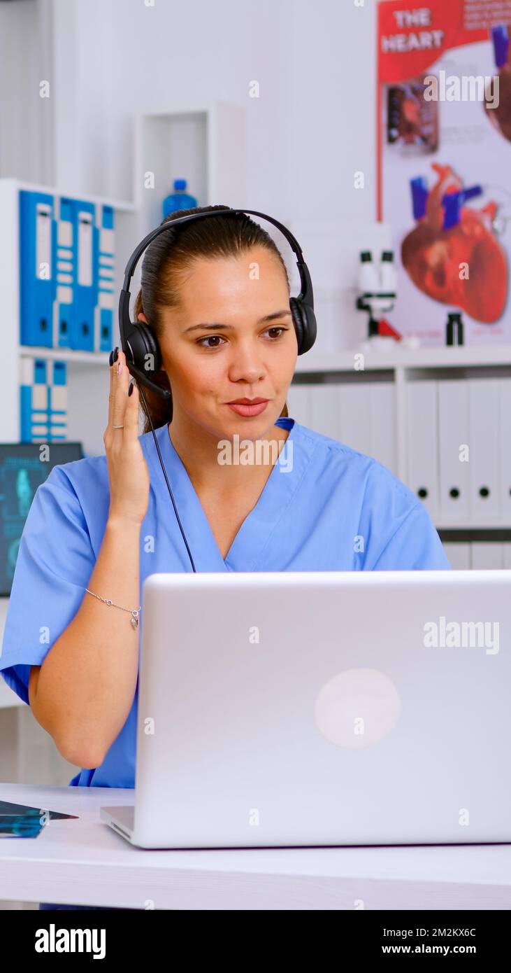 Nurse talking patients using headset hi-res stock photography and ...