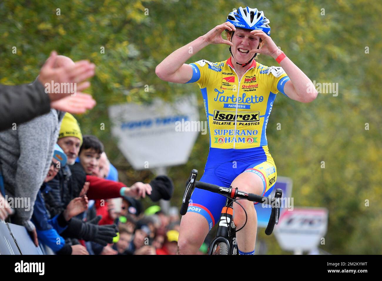 Belgian Kim Van De Steene celebrates as she crosses the finish line to ...