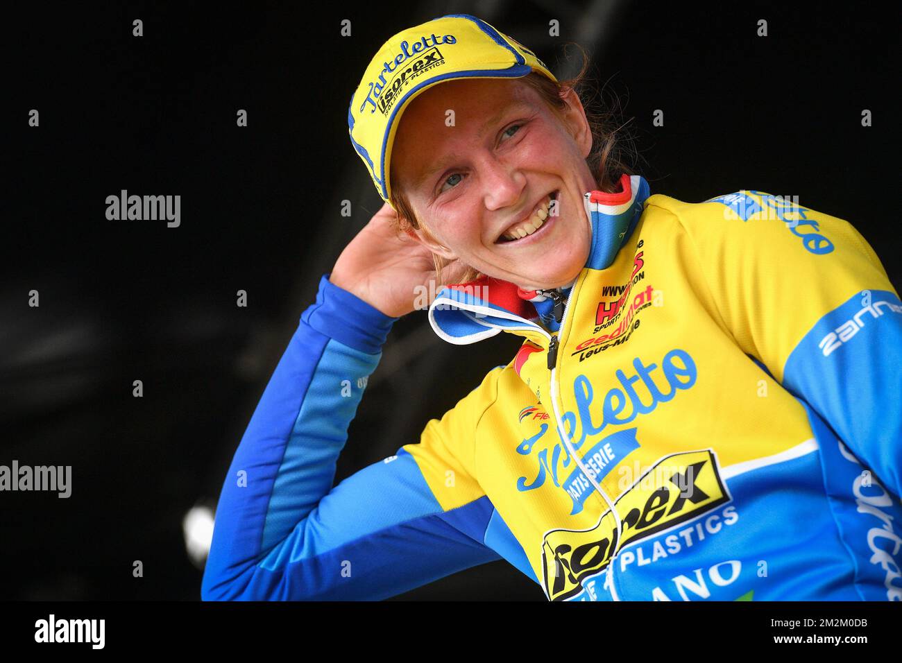 Belgian Kim Van De Steene celebrates on the podium after winning the ...