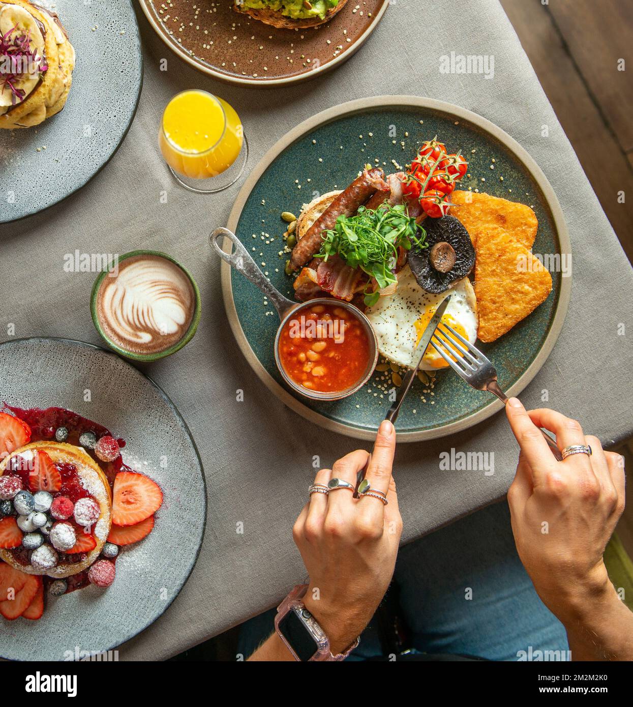 A vertical closeup of the table with various dishes. Traditional ...
