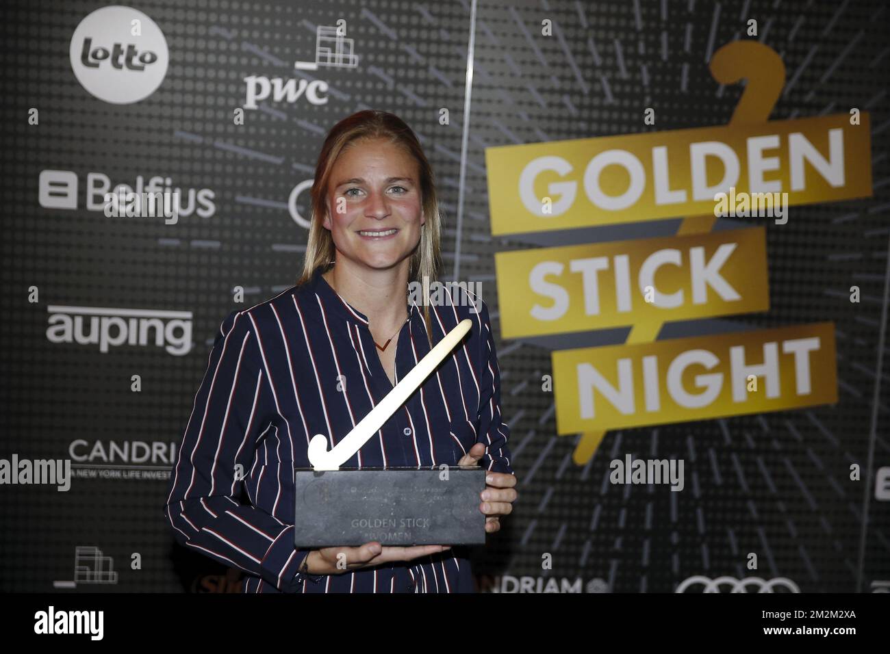 Golden Stick winner Alix Gerniers poses for the photographer at a ...