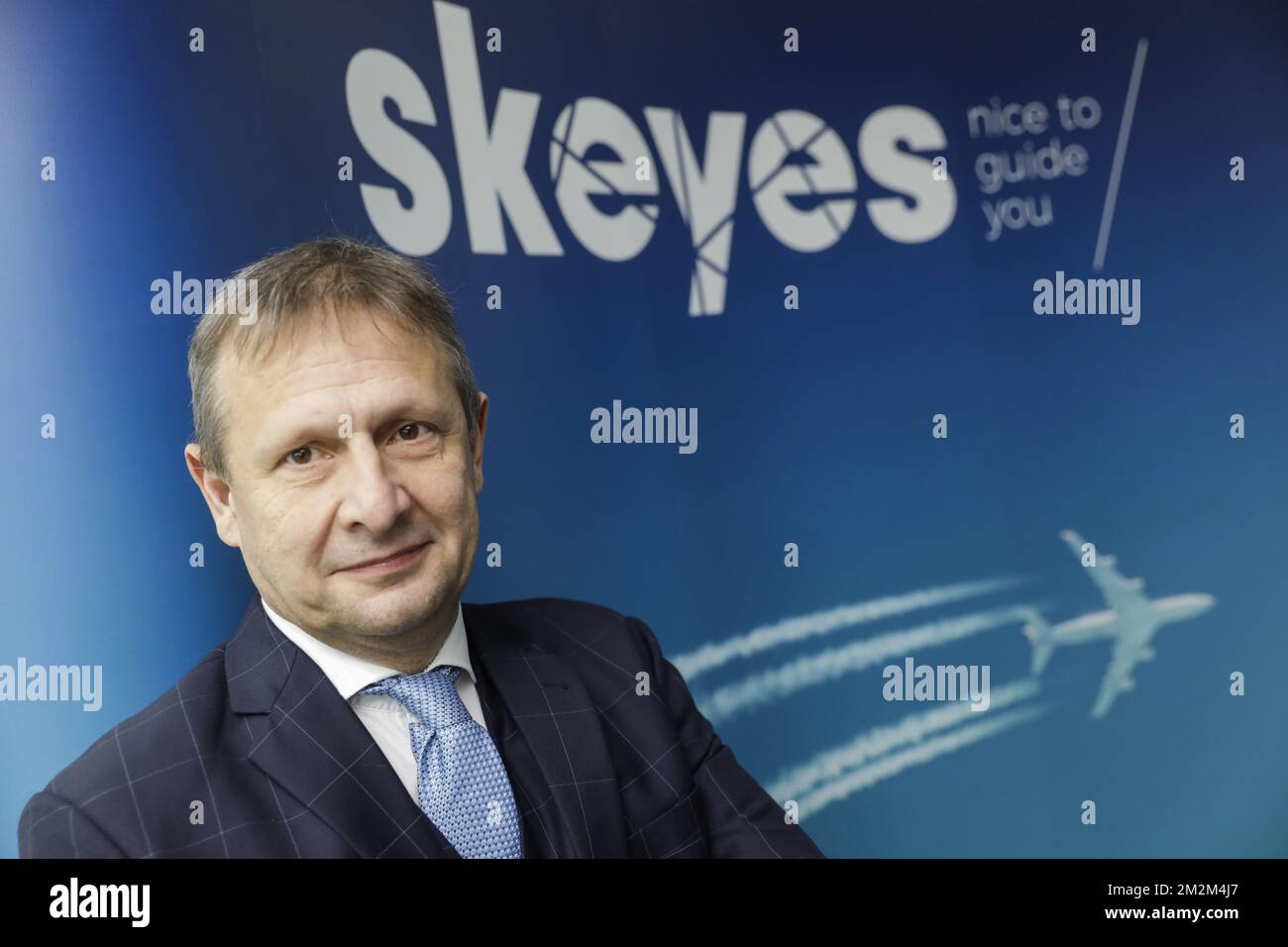 Belgocontrol CEO Johan Decuyper poses with the 'skeyes' logo, the new ...