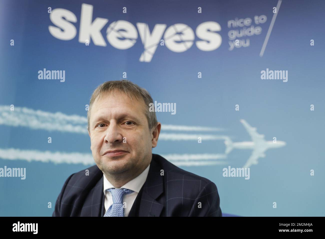 Belgocontrol CEO Johan Decuyper poses with the 'skeyes' logo, the new ...