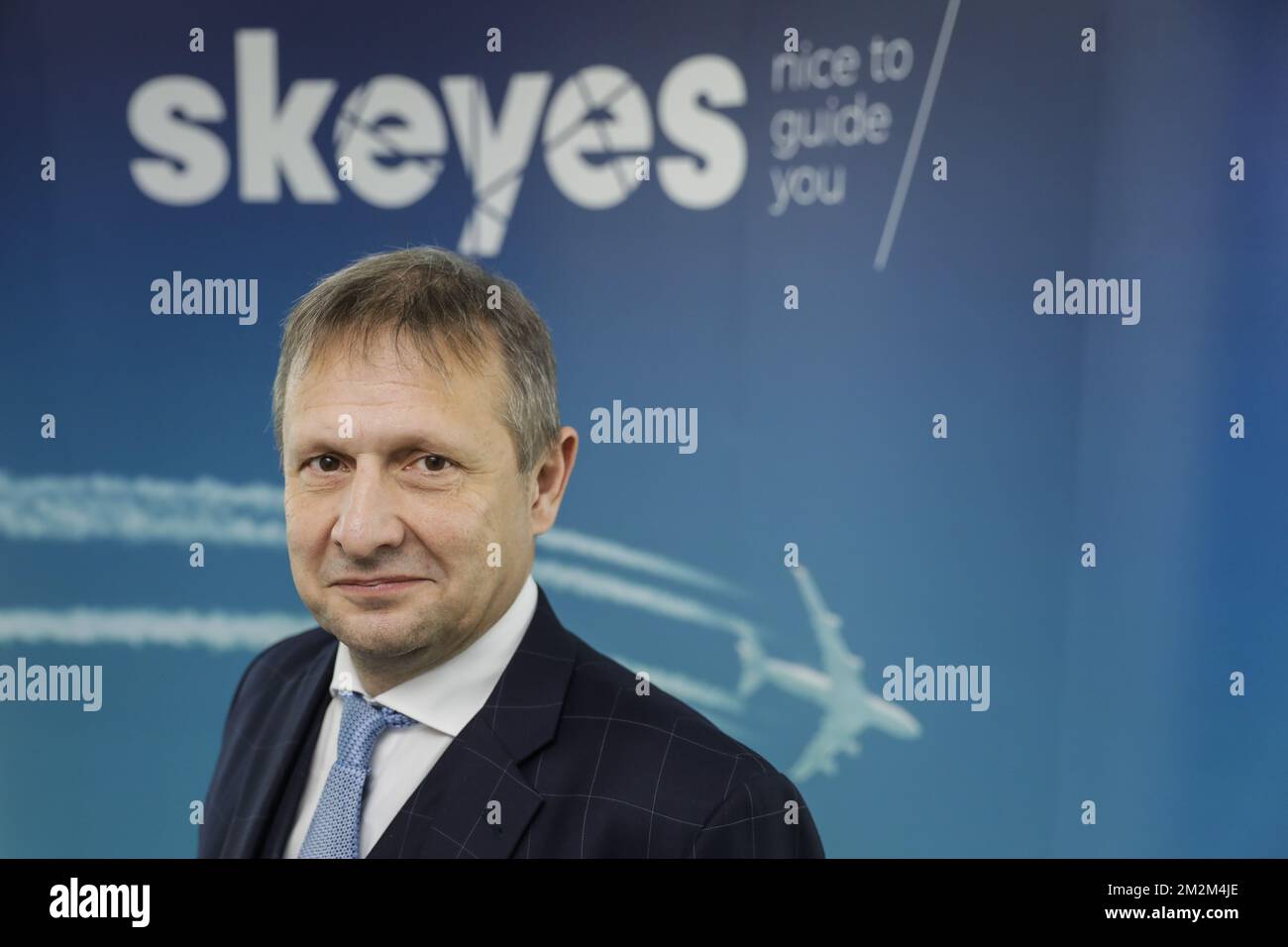 Belgocontrol CEO Johan Decuyper poses with the 'skeyes' logo, the new ...