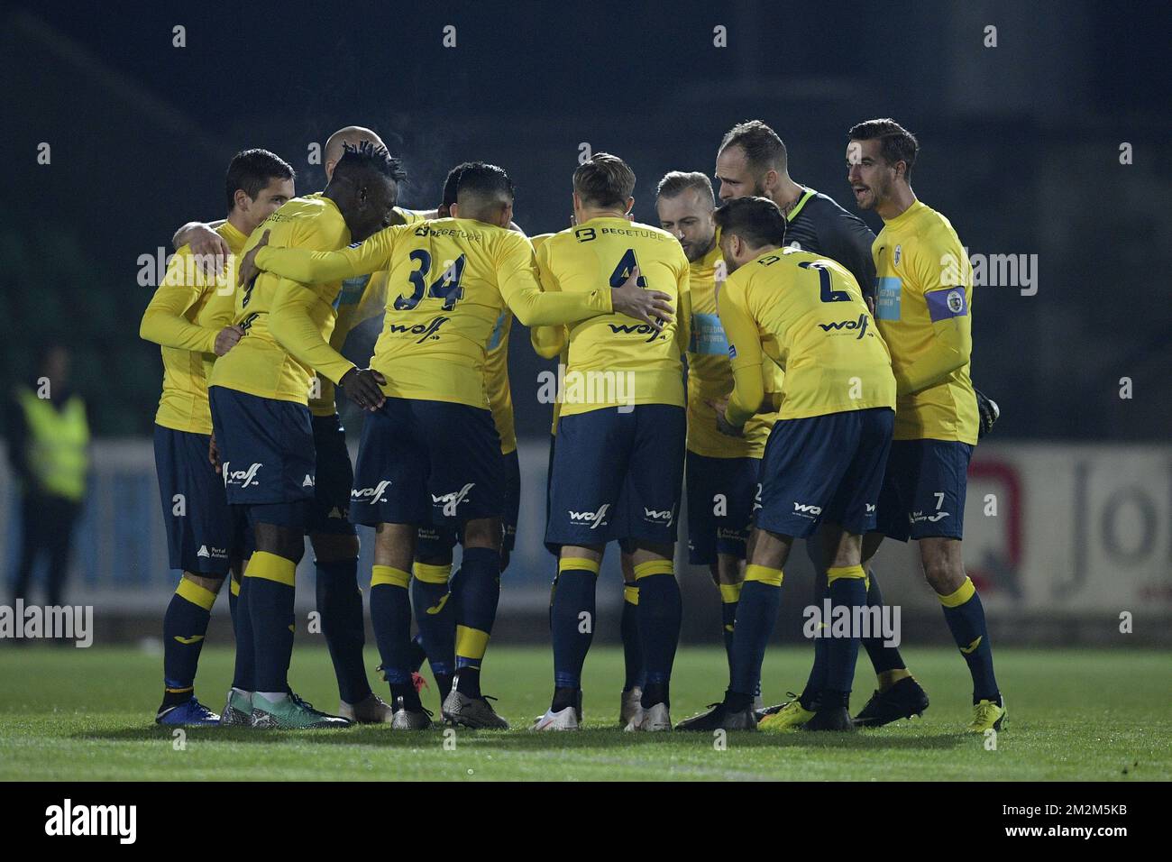 Beerschot's players pictured at the start of a soccer game between ...