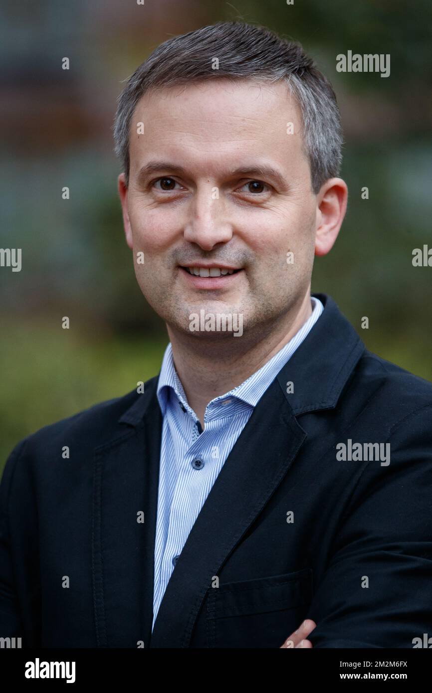 Geert Asman poses for the photographer after a press conference to ...