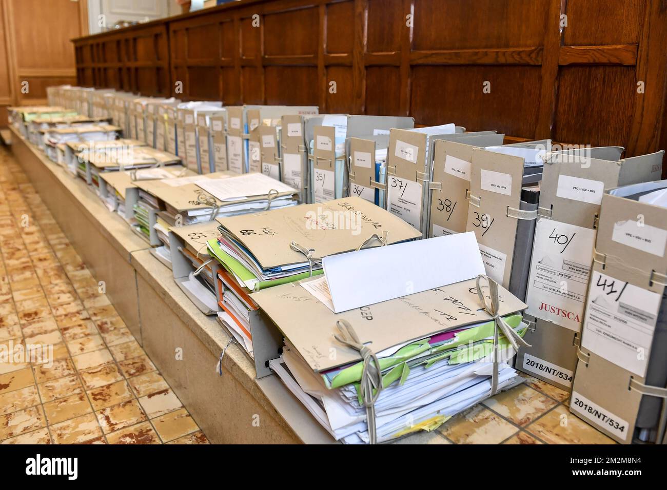 Illustration picture shows folders with the case files, at the start of ...
