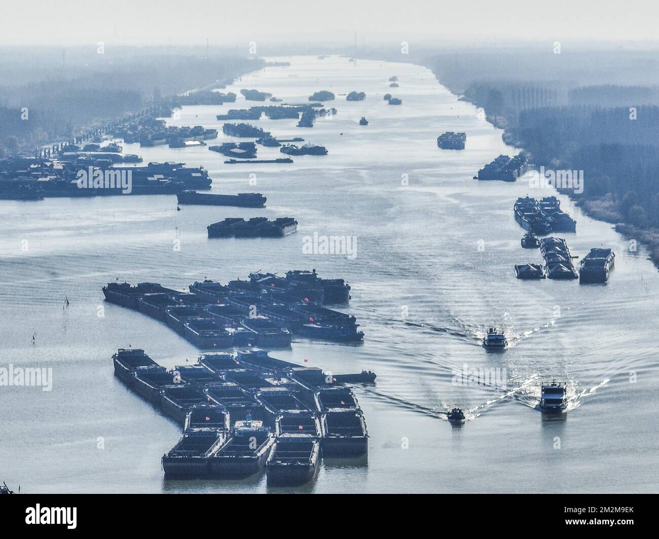 Aerial photo shows freight ships are busy transporting coals between ...