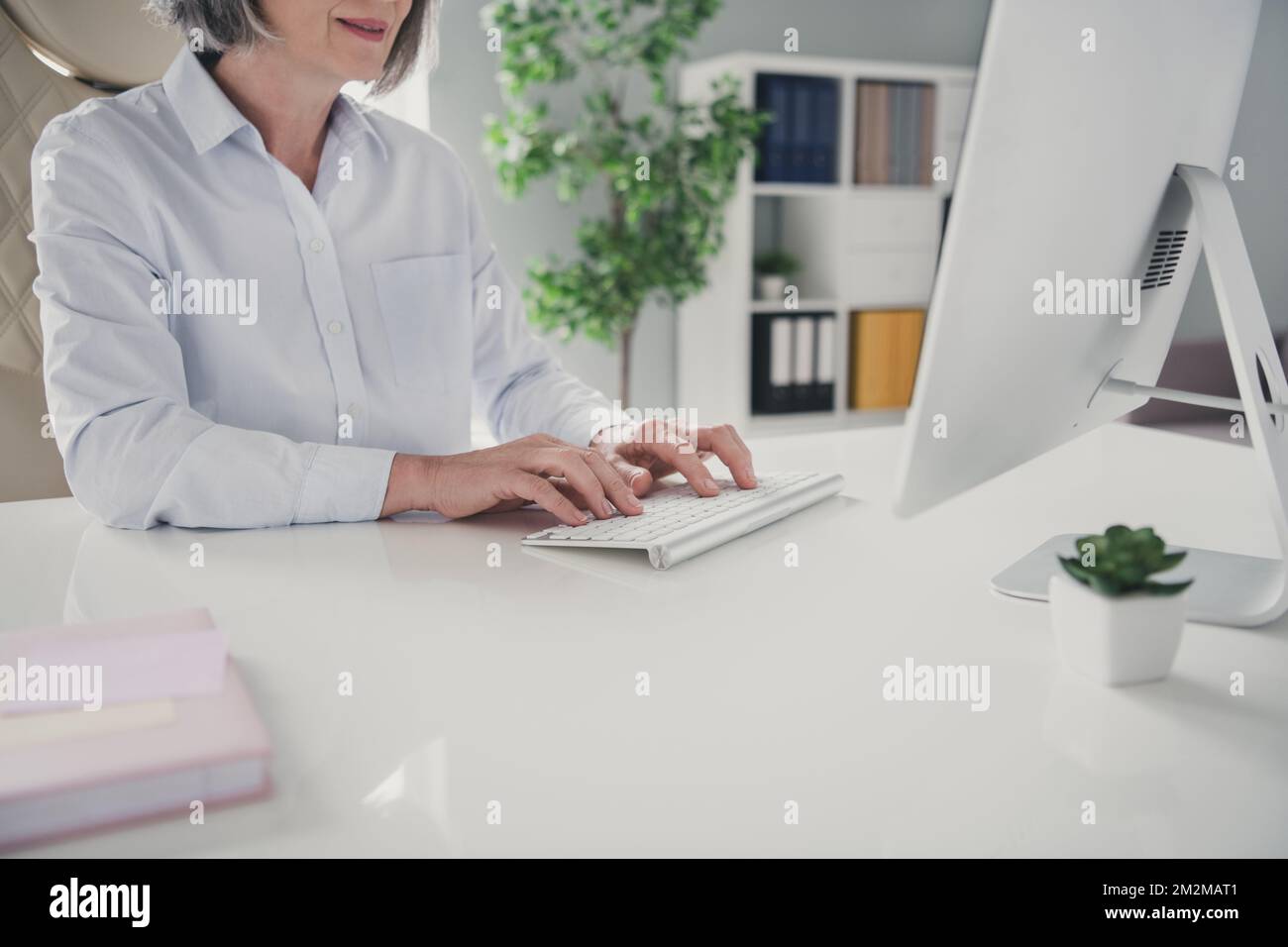 Photo of busy serious lady freelancer wear white shirt programming ...
