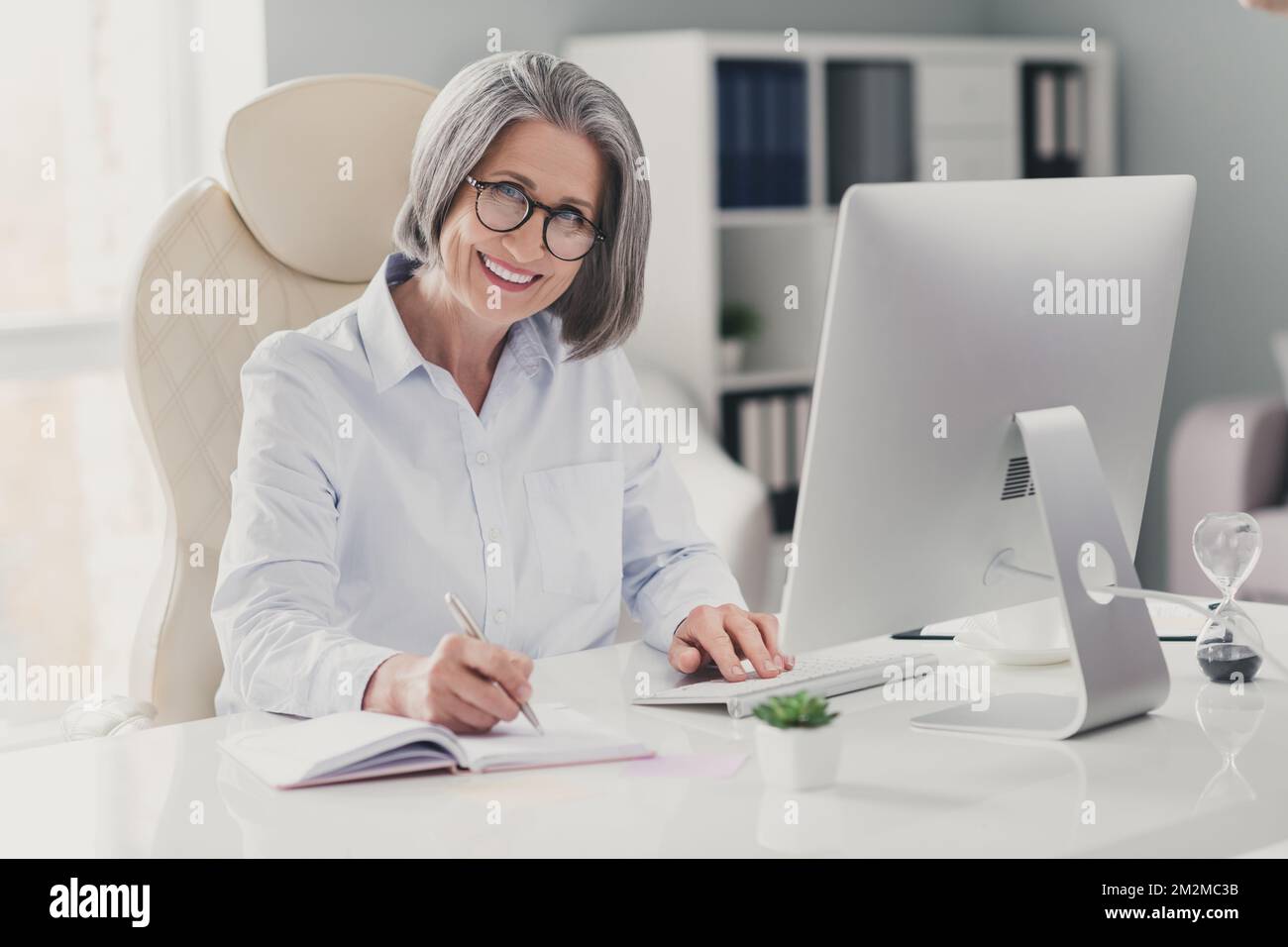 Photo of cheerful smiling lady assistant wear spectacles white shirt ...