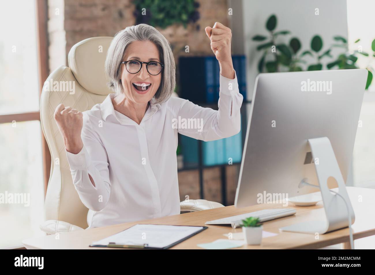 Photo of smiling lucky lady boss wear white shirt eyeglasses rising ...