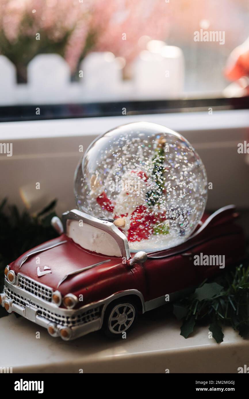 Beautiful snow globe on windowsill hi-res stock photography and images ...