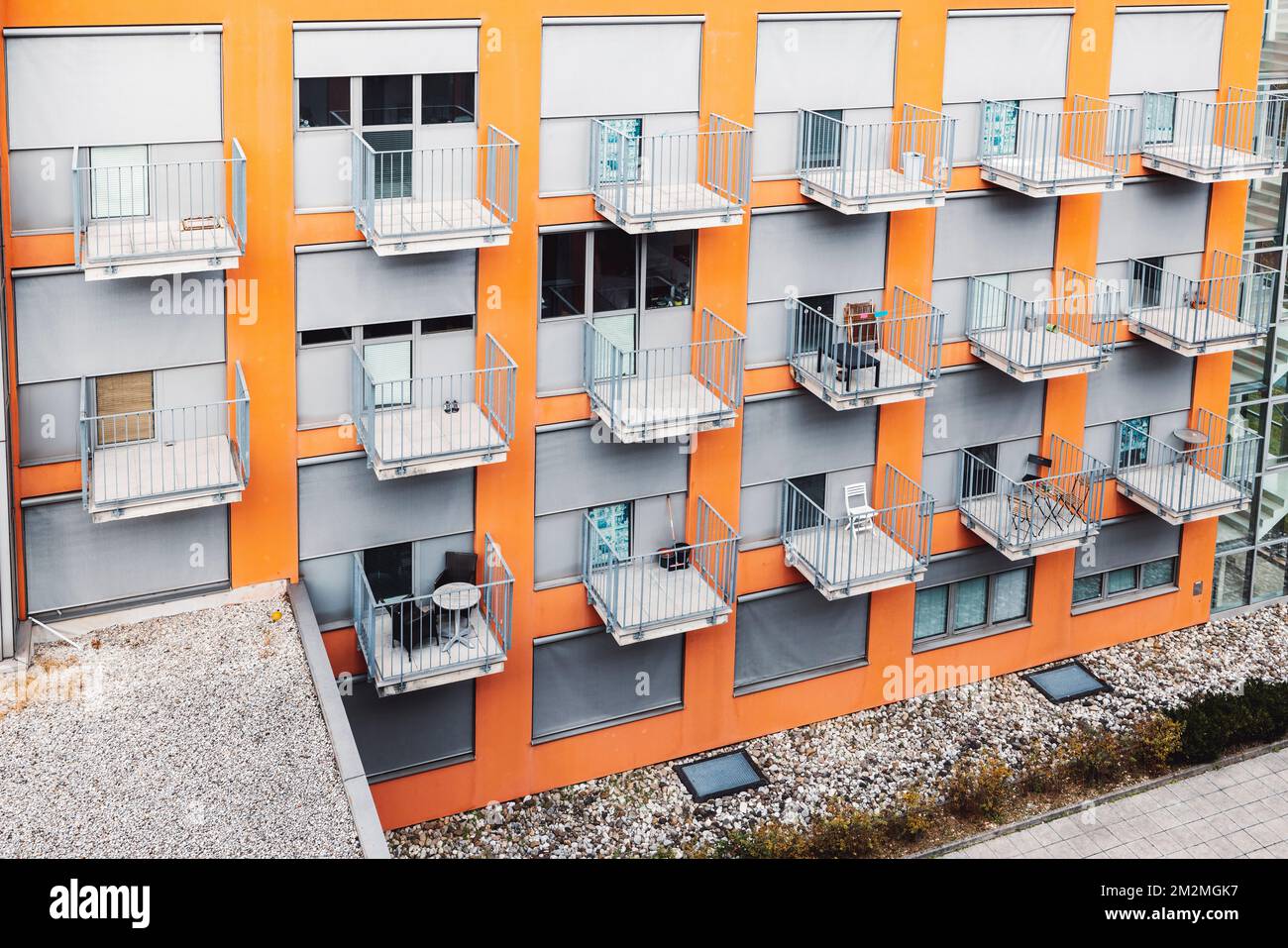 Outside view of orange college dorm rooms Stock Photo - Alamy