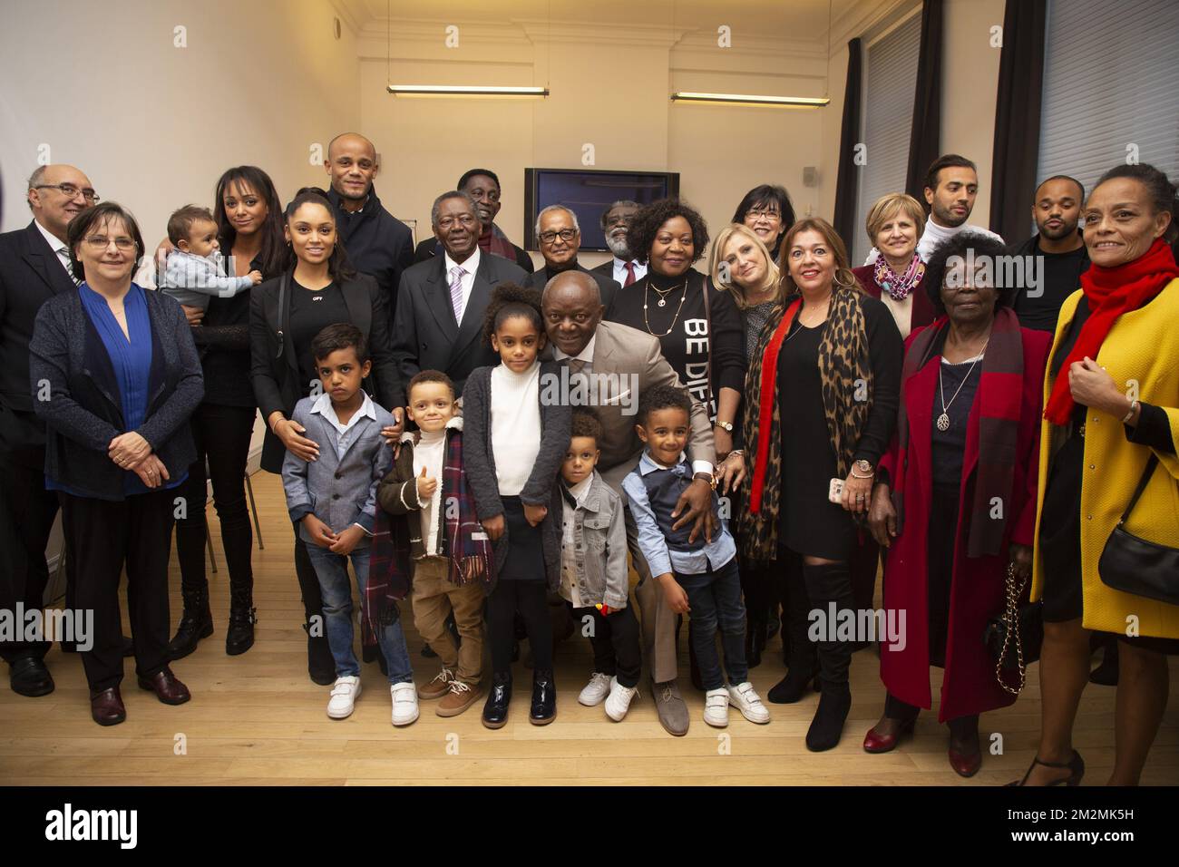 Future mayor of Ganshoren, cdH Pierre Kompany poses with his family ...