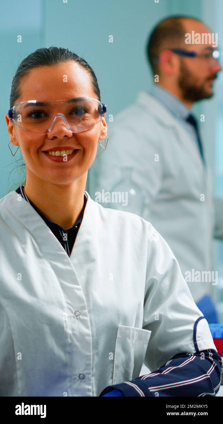 Laboratory doctor looking at camera smiling in modern equipped lab ...