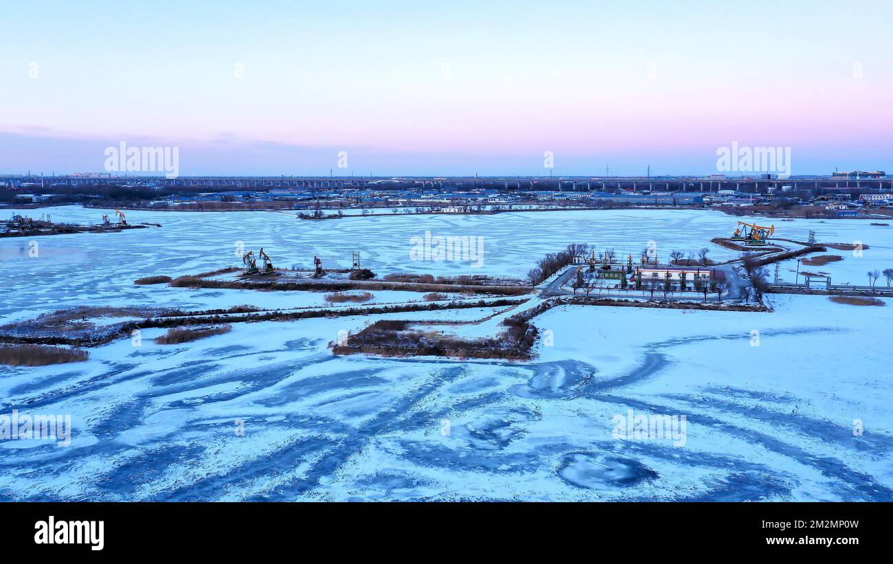 Aerial photo shows the oil extraction site after snow in the Daqing Oil ...