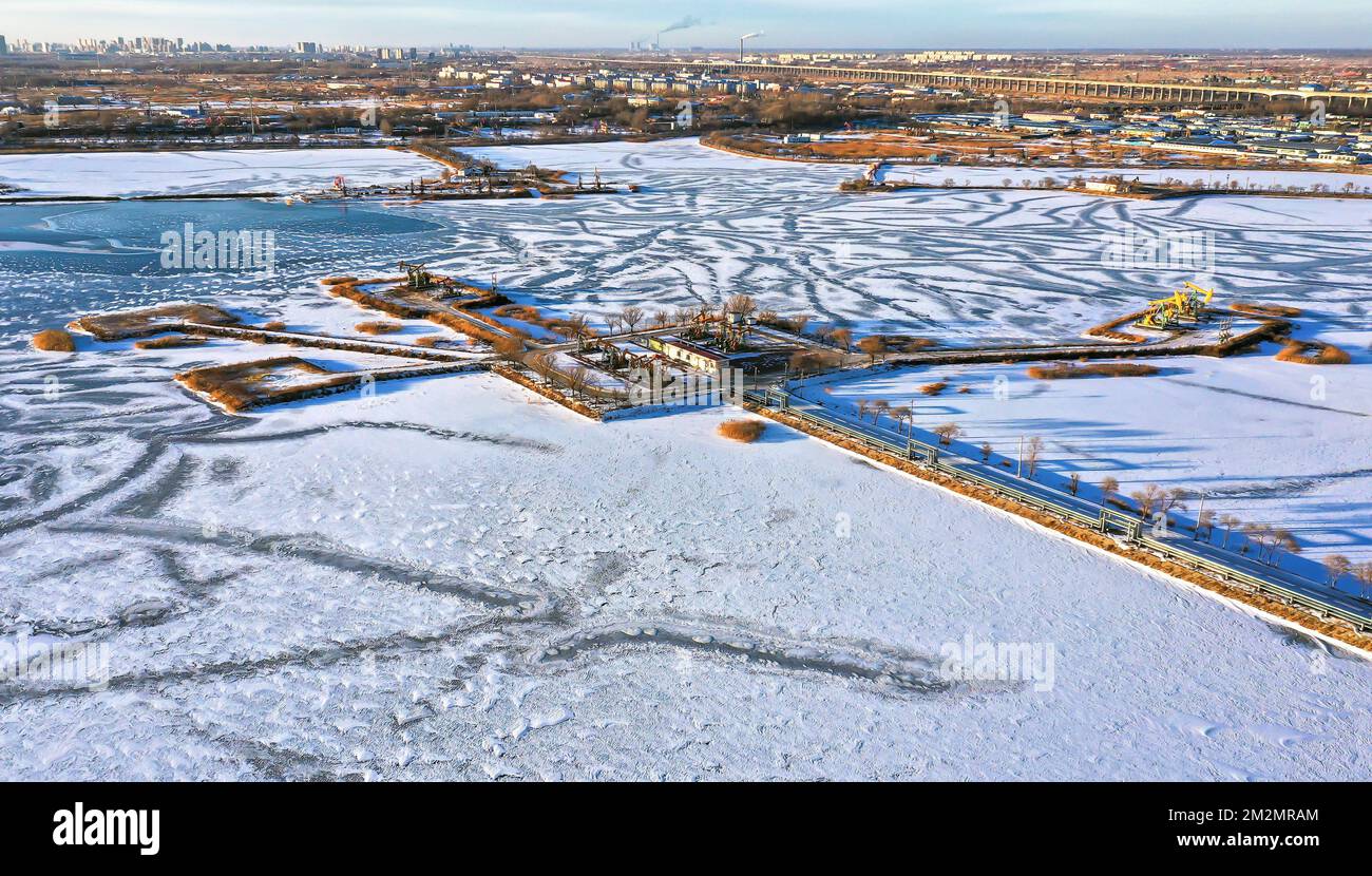 Aerial photo shows the oil extraction site after snow in the Daqing Oil ...