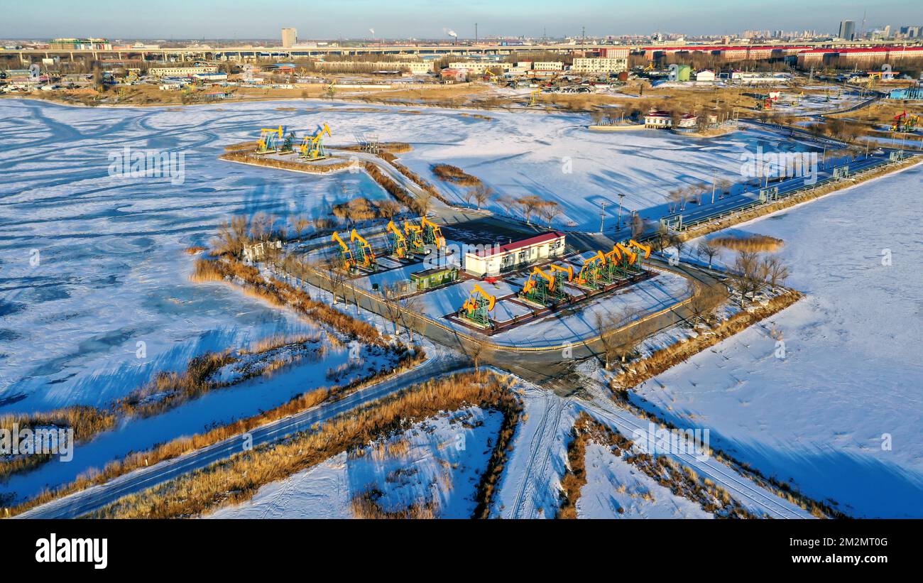 Aerial photo shows the oil extraction site after snow in the Daqing Oil ...