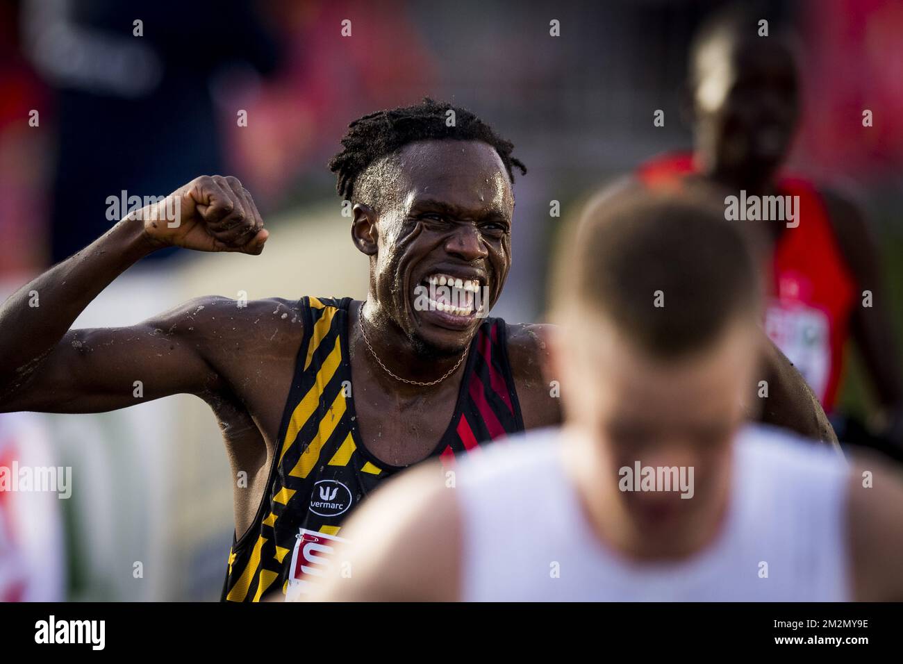 Belgian Isaac Kimeli celebrates as he crosses the finish line at the ...