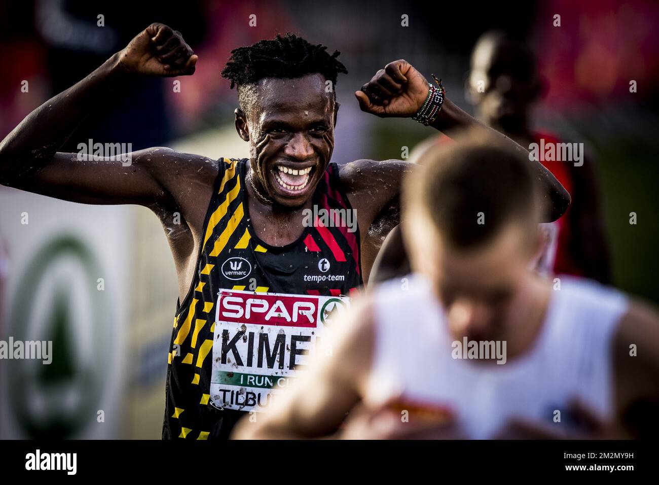 Belgian Isaac Kimeli celebrates as he crosses the finish line at the ...
