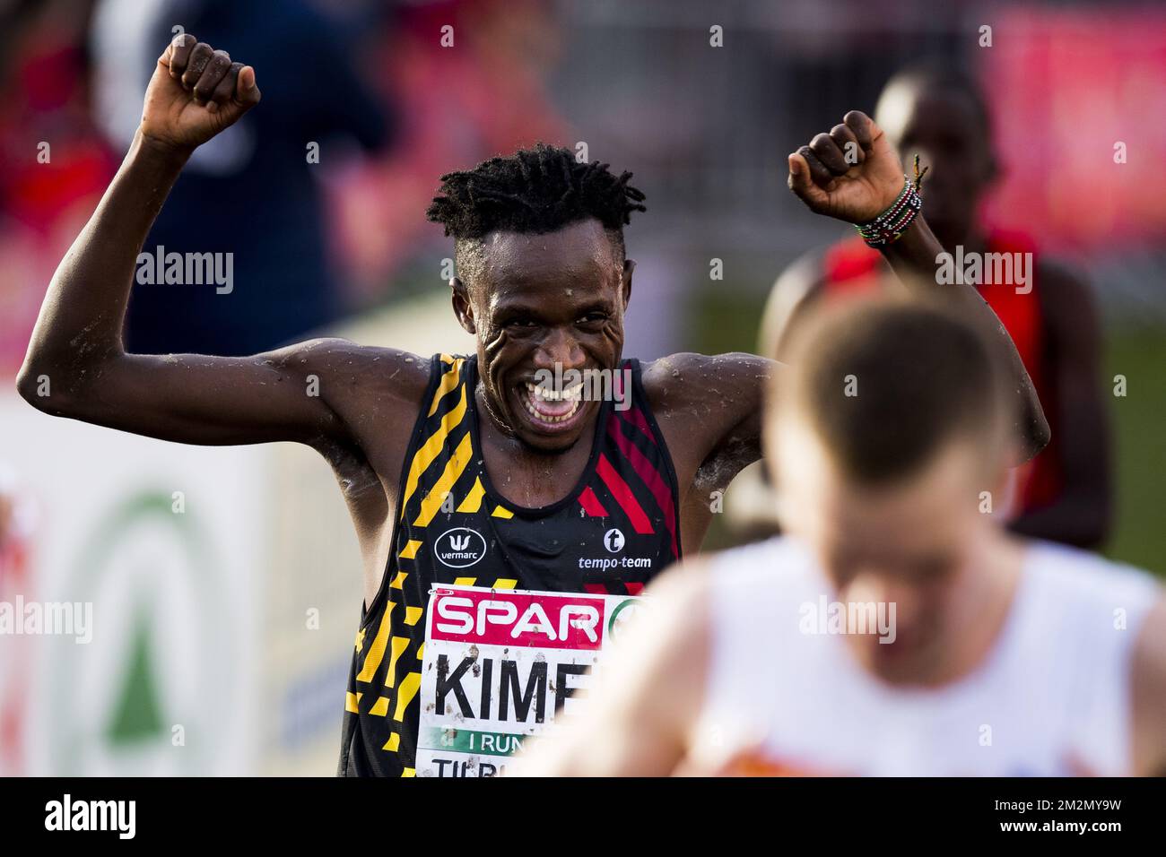 Belgian Isaac Kimeli celebrates as he crosses the finish line at the ...