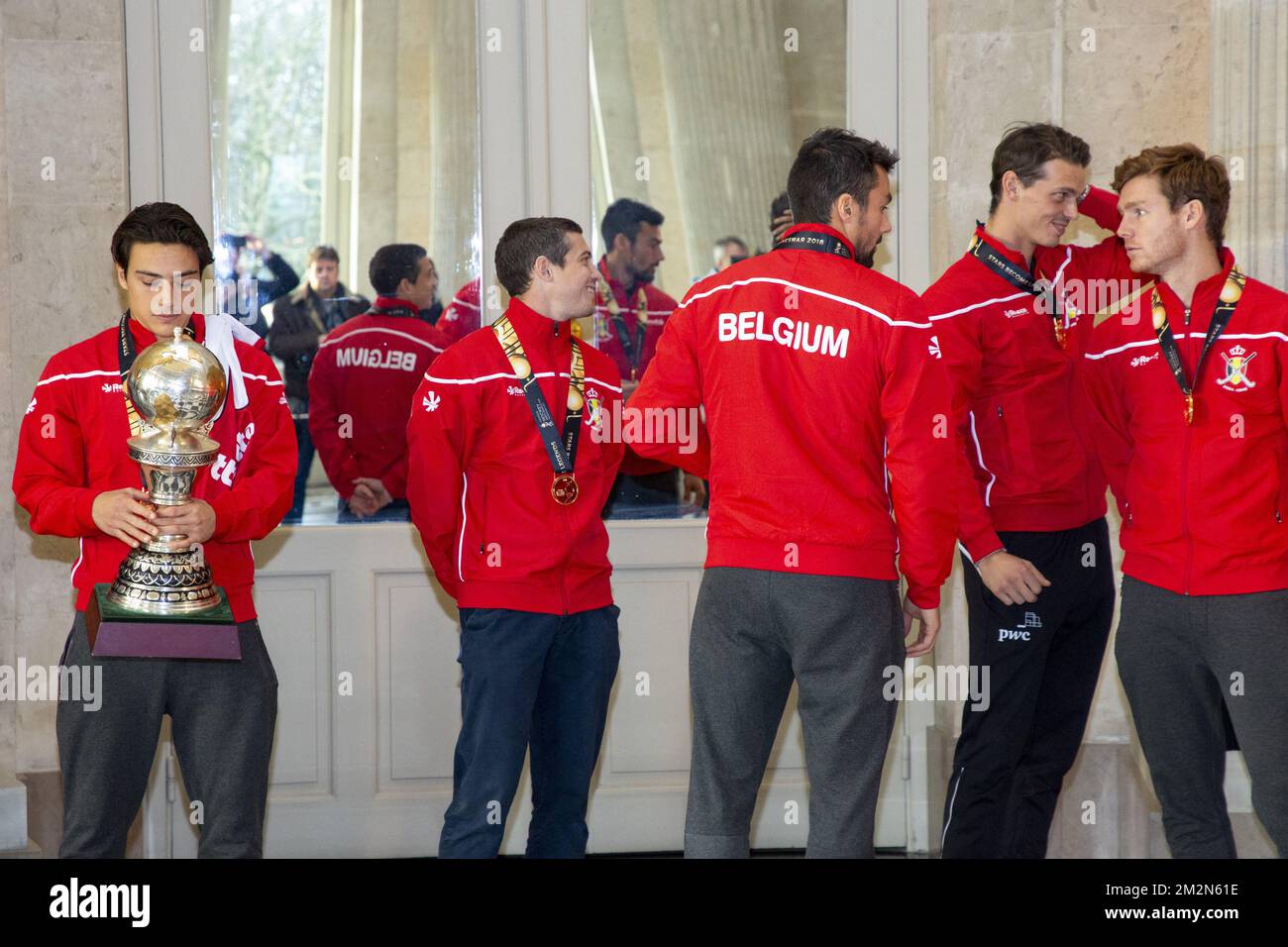 Belgium's captain Thomas Briels, holding the World Cup trophy, pictured ...