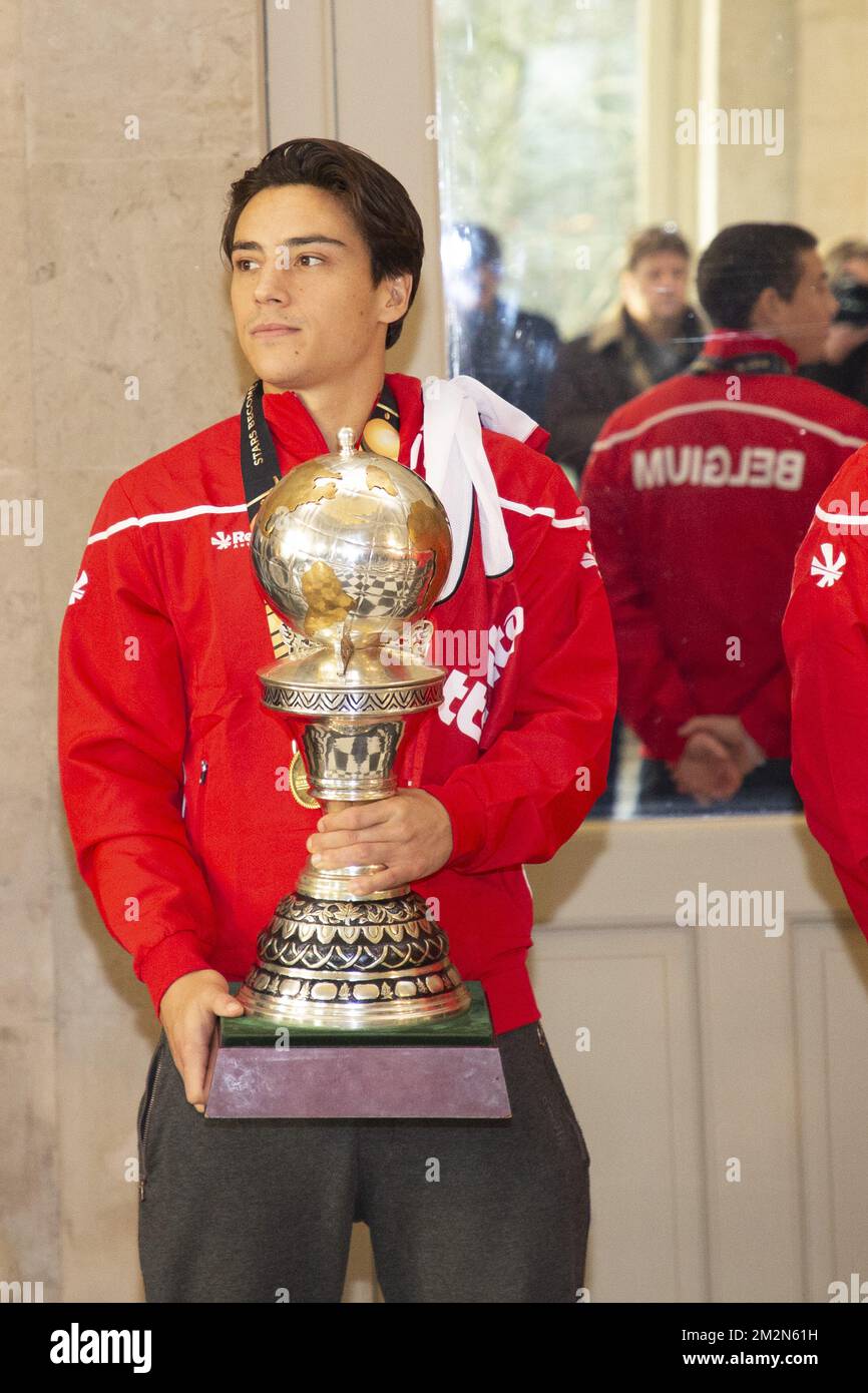 Belgium's captain Thomas Briels, holding the World Cup trophy, pictured ...