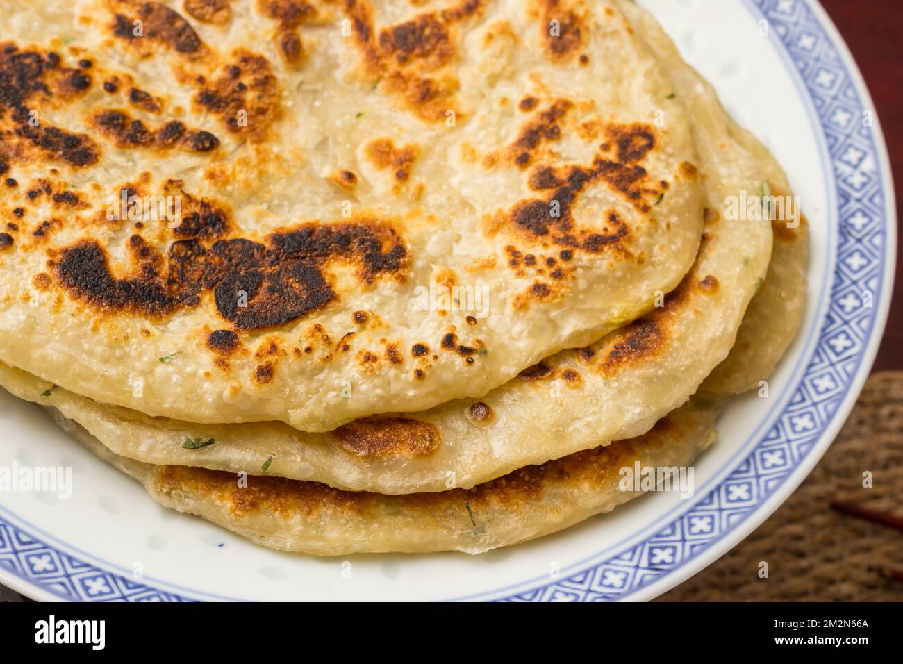 Traditional chinese pancakes served on a plate Stock Photo - Alamy