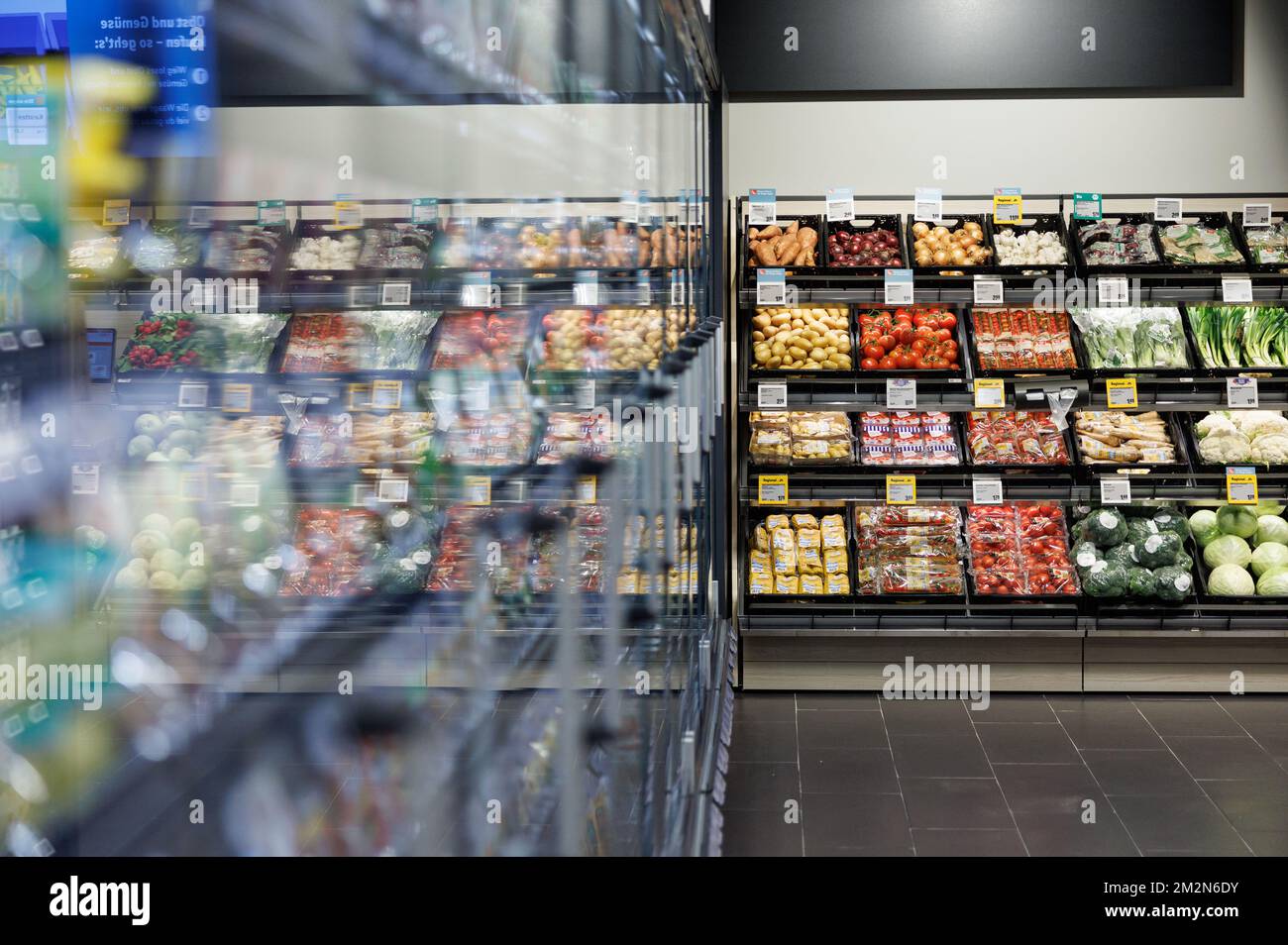 Munich, Germany. 14th Dec, 2022. Shelves of groceries stand in the ...