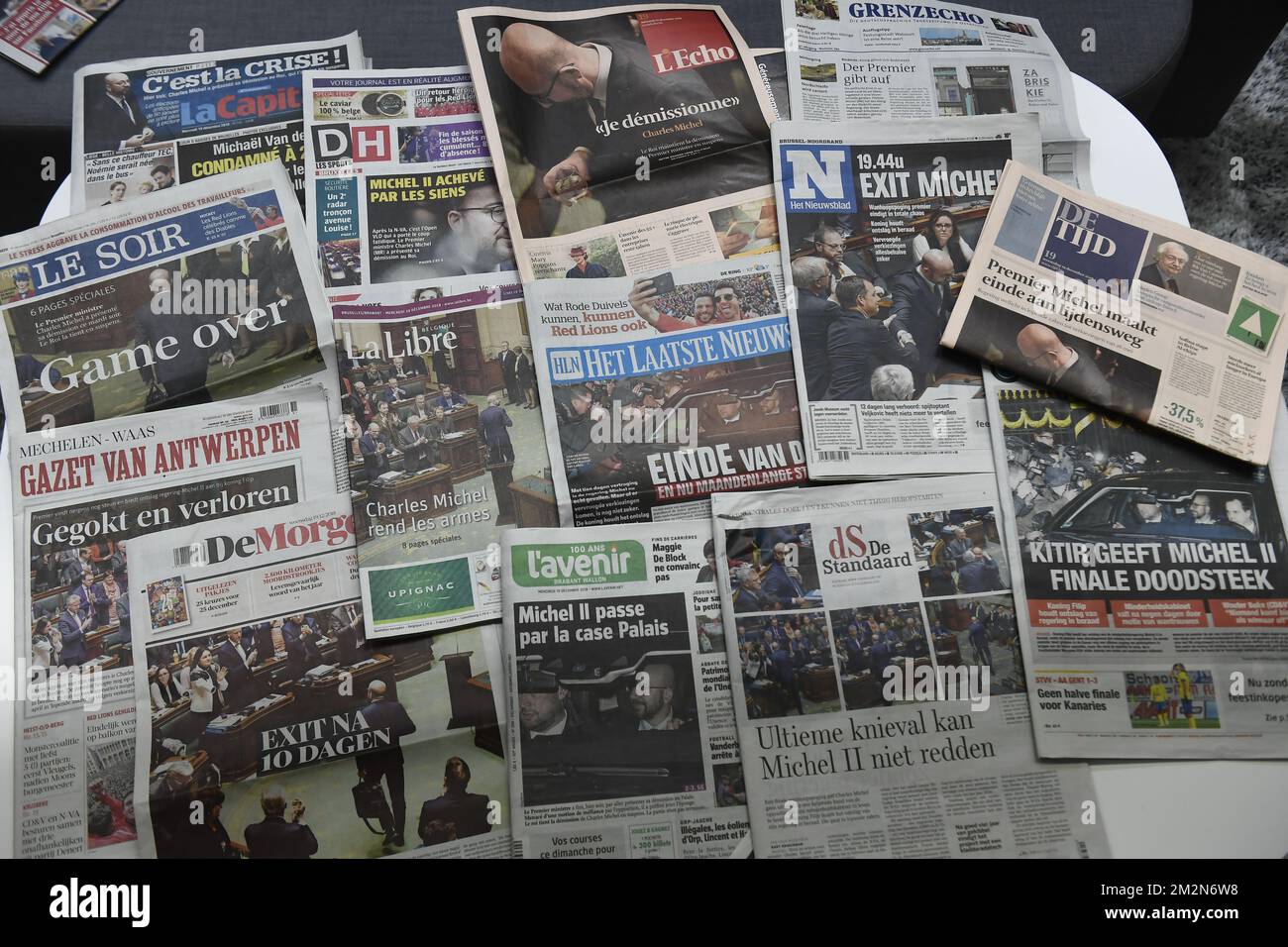 Illustration shows front pages of Belgian newspapers with the ...