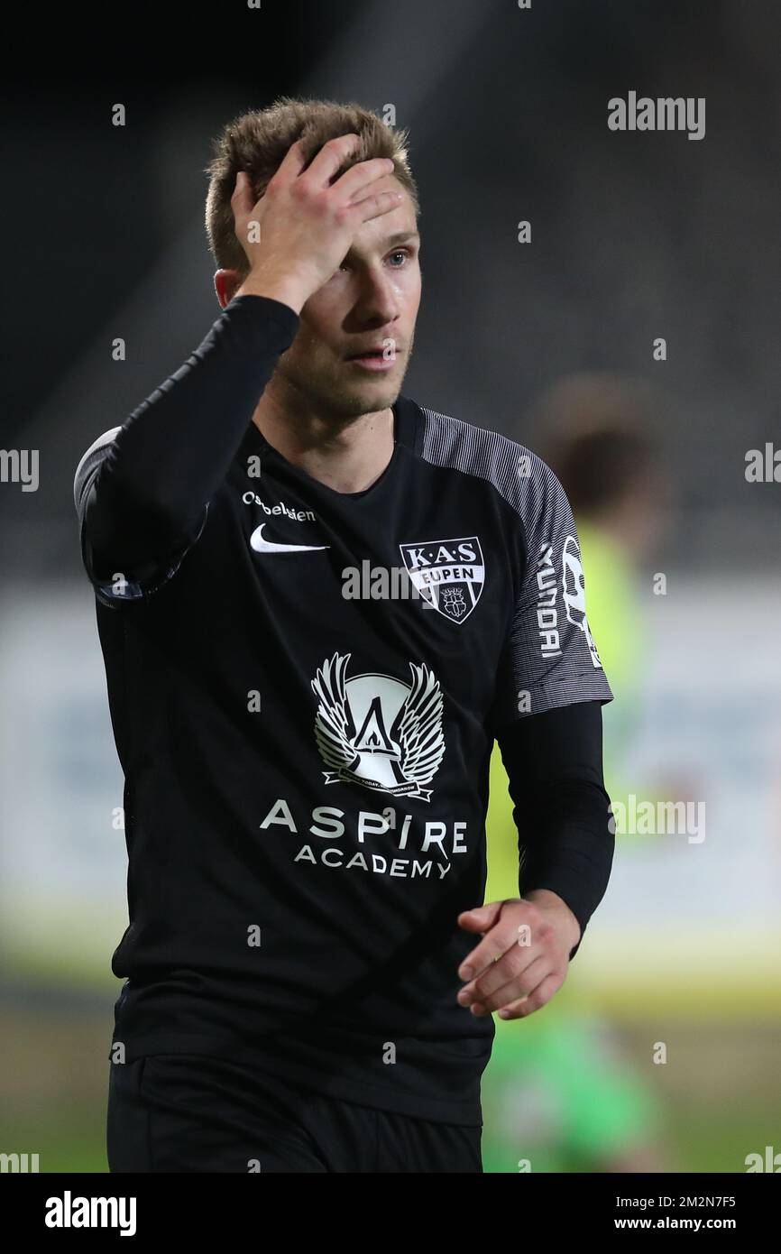 Eupen's Nils Schouterden looks dejected after a soccer game between KAS ...