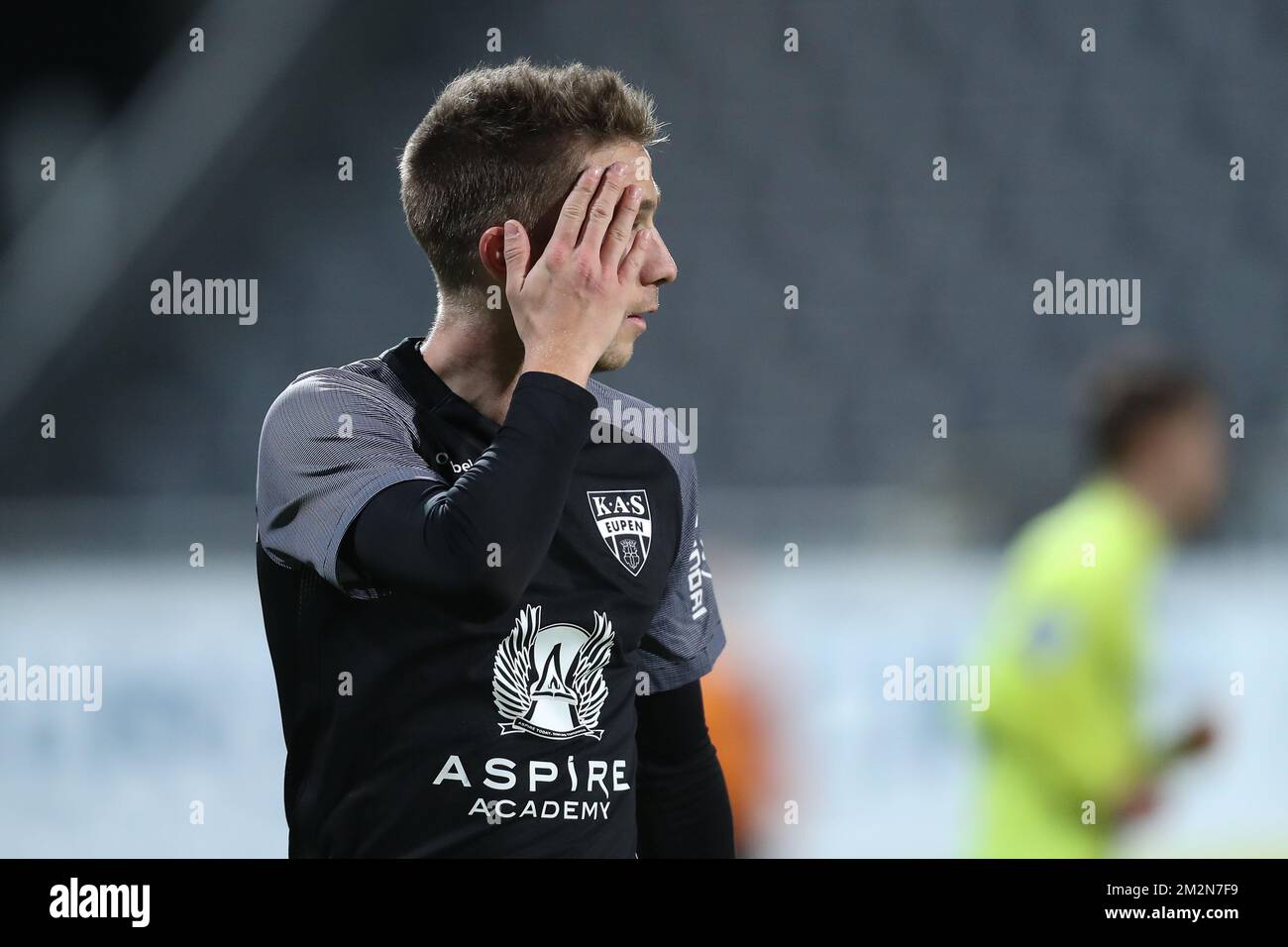 Eupen's Nils Schouterden looks dejected after a soccer game between KAS ...