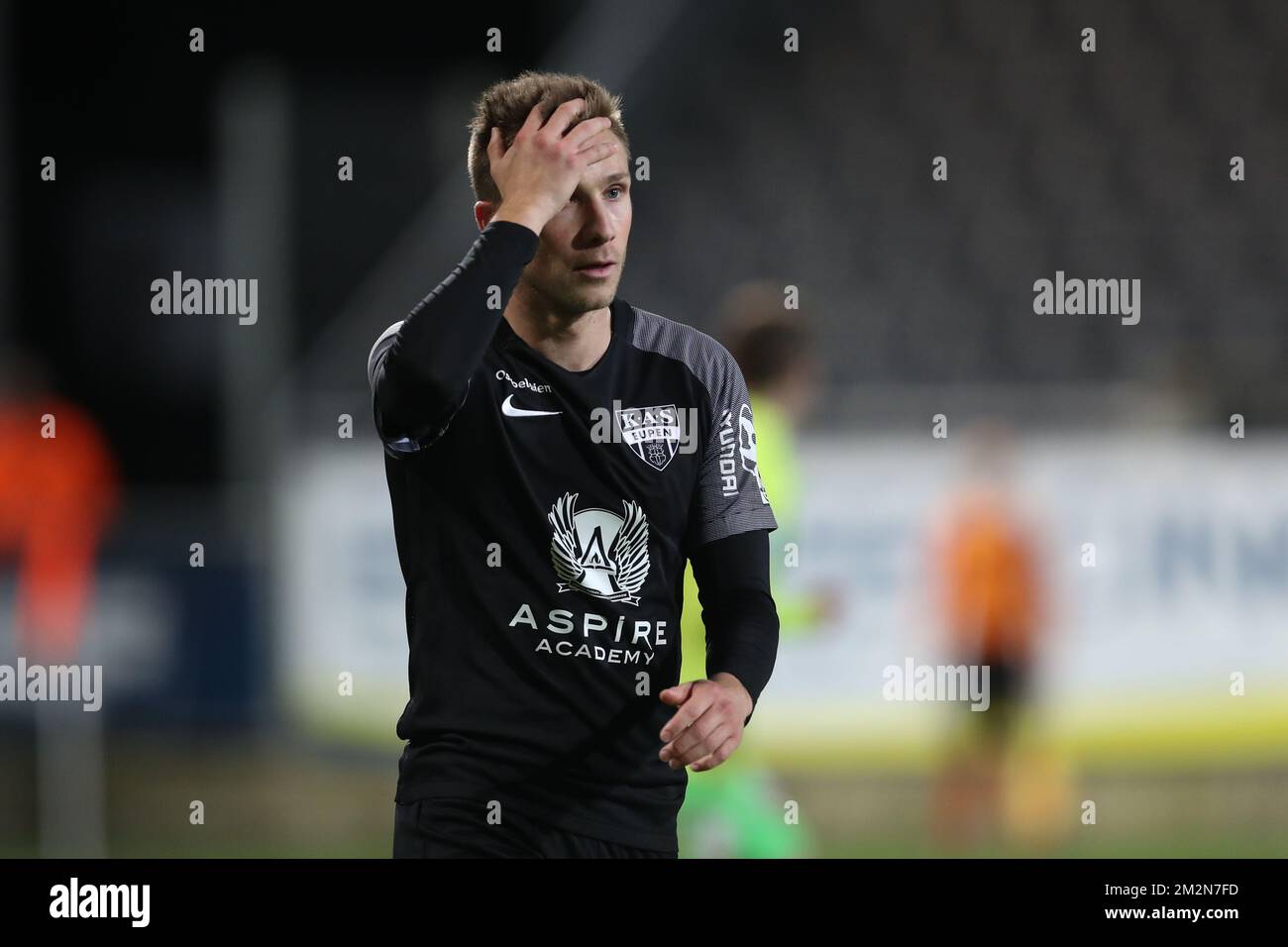 Eupen's Nils Schouterden looks dejected after a soccer game between KAS ...
