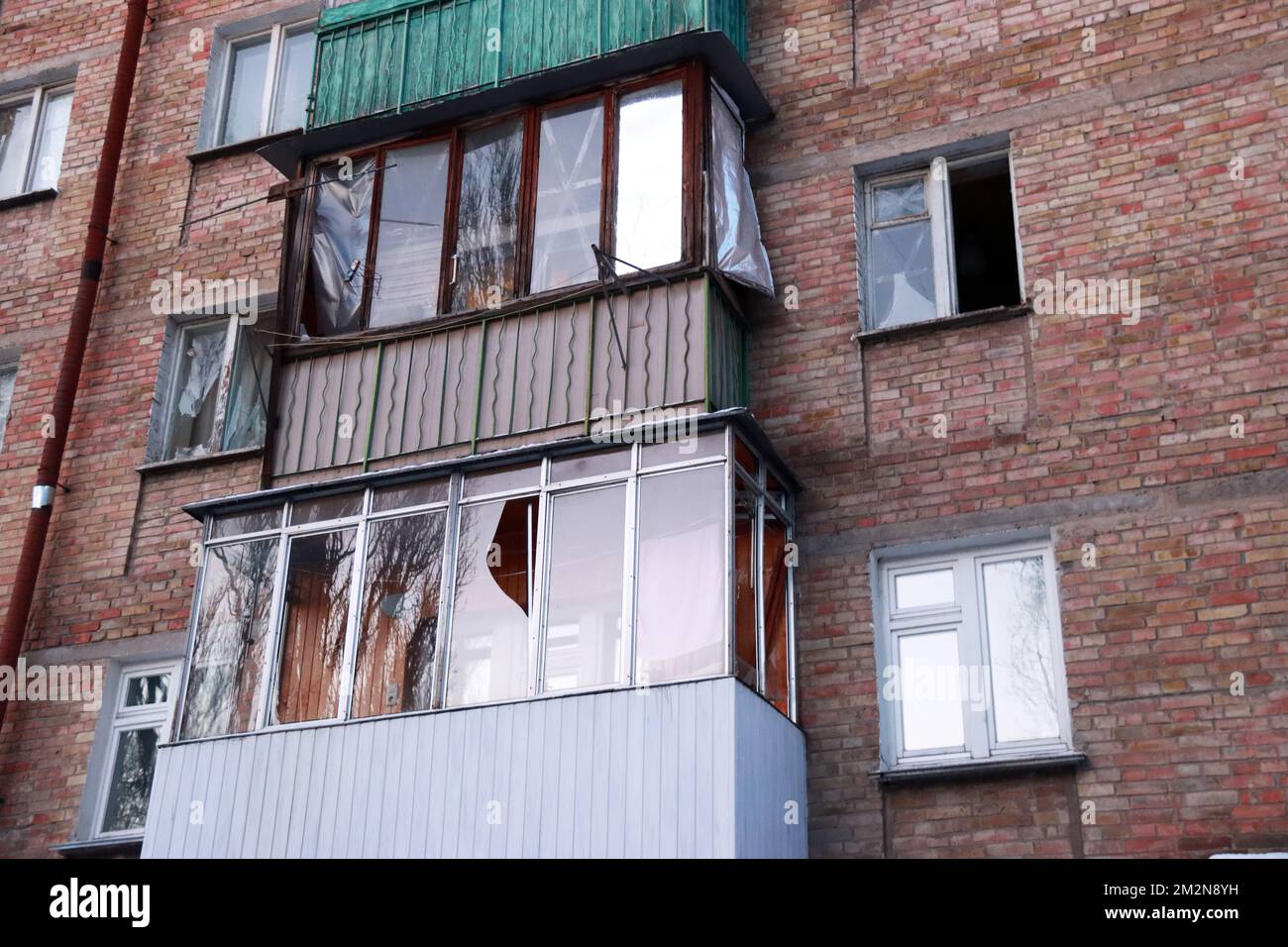 KYIV, UKRAINE - DECEMBER 14, 2022 - Shattered windows are pictured near ...