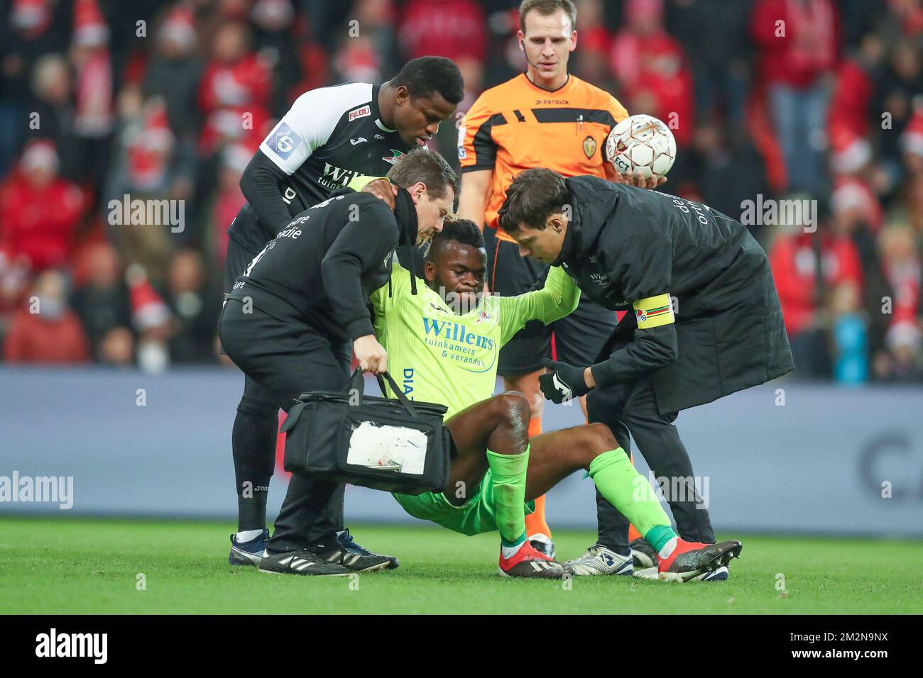 Oostende's Aristote Nkaka Bazunga leaves the field after receiving a ...