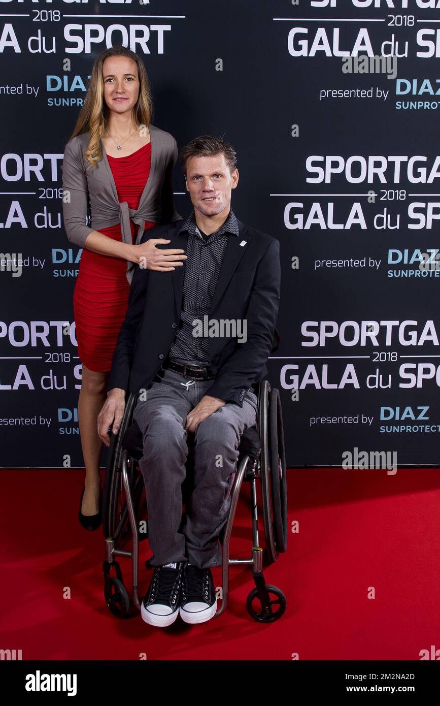 Wheelchair athlete Peter Genyn and his partner pictured on the red ...