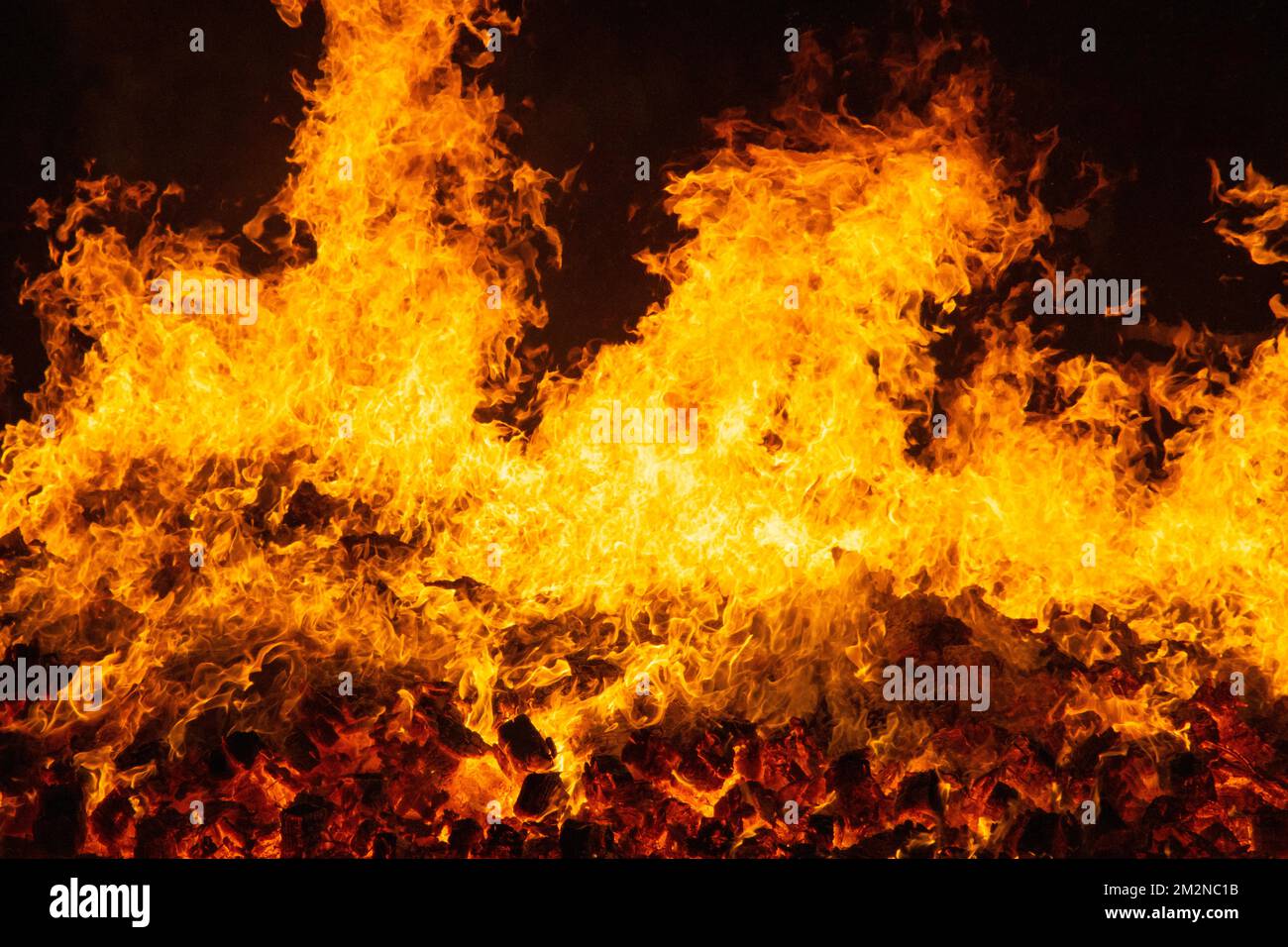 Fire by night. Flames and embers. Hell and inferno Stock Photo - Alamy