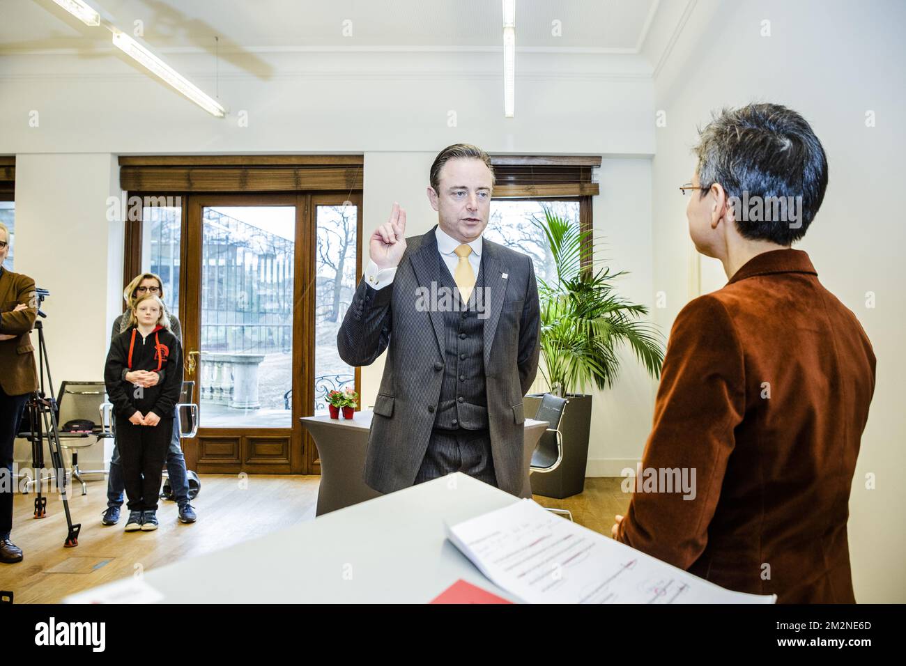 Antwerp Mayor Bart De Wever (C), his wife Veerle Hegge and their daughter (L), and Antwerp ...