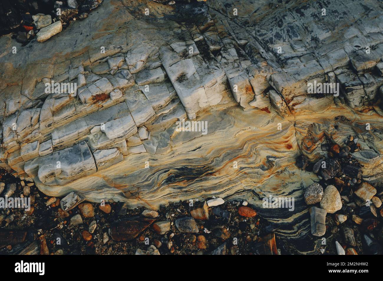 An alien-like rock texture background with pebbles Stock Photo - Alamy