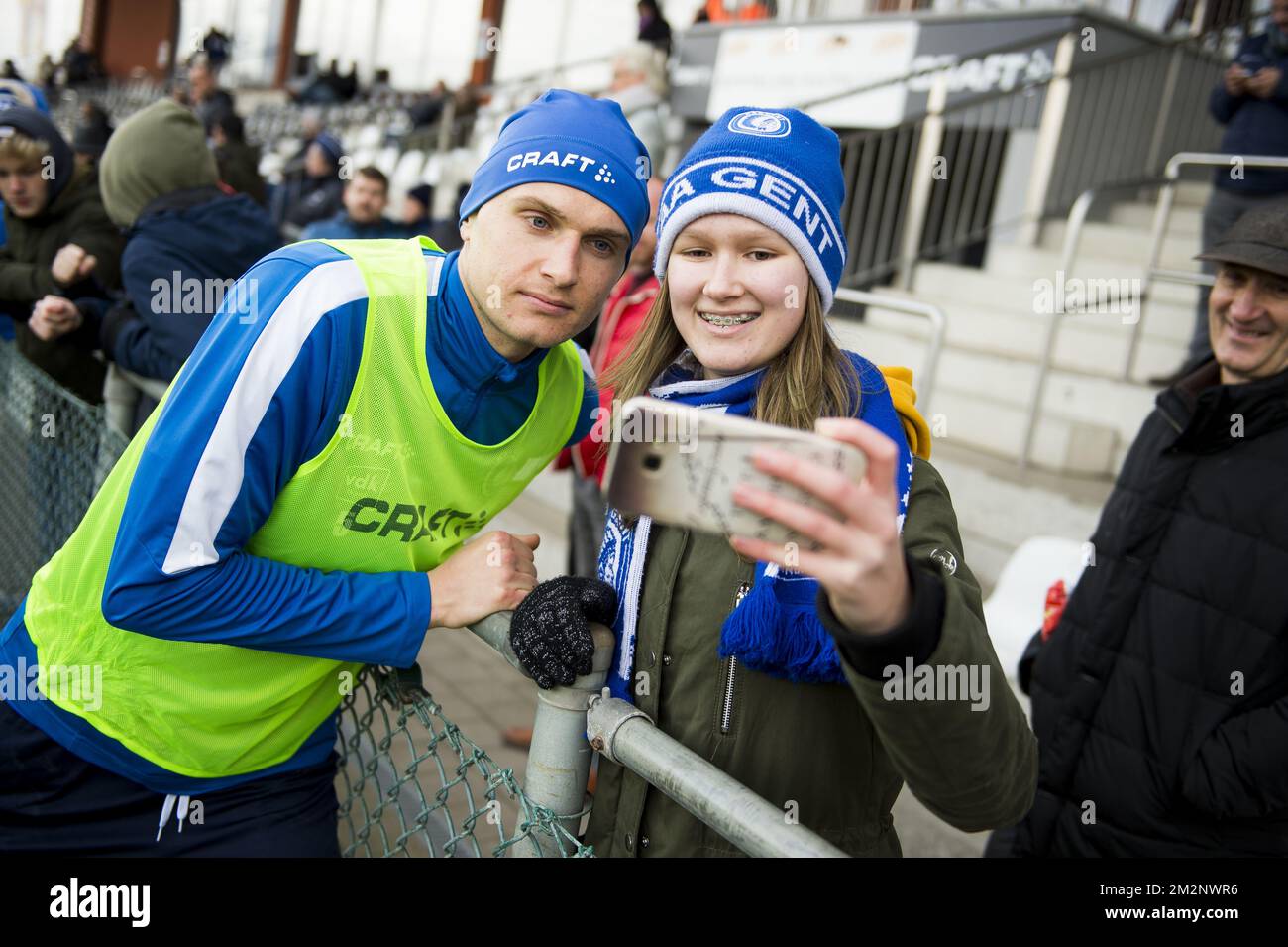 Gent's Igor Plastun poses for a picture with fans after a training ...