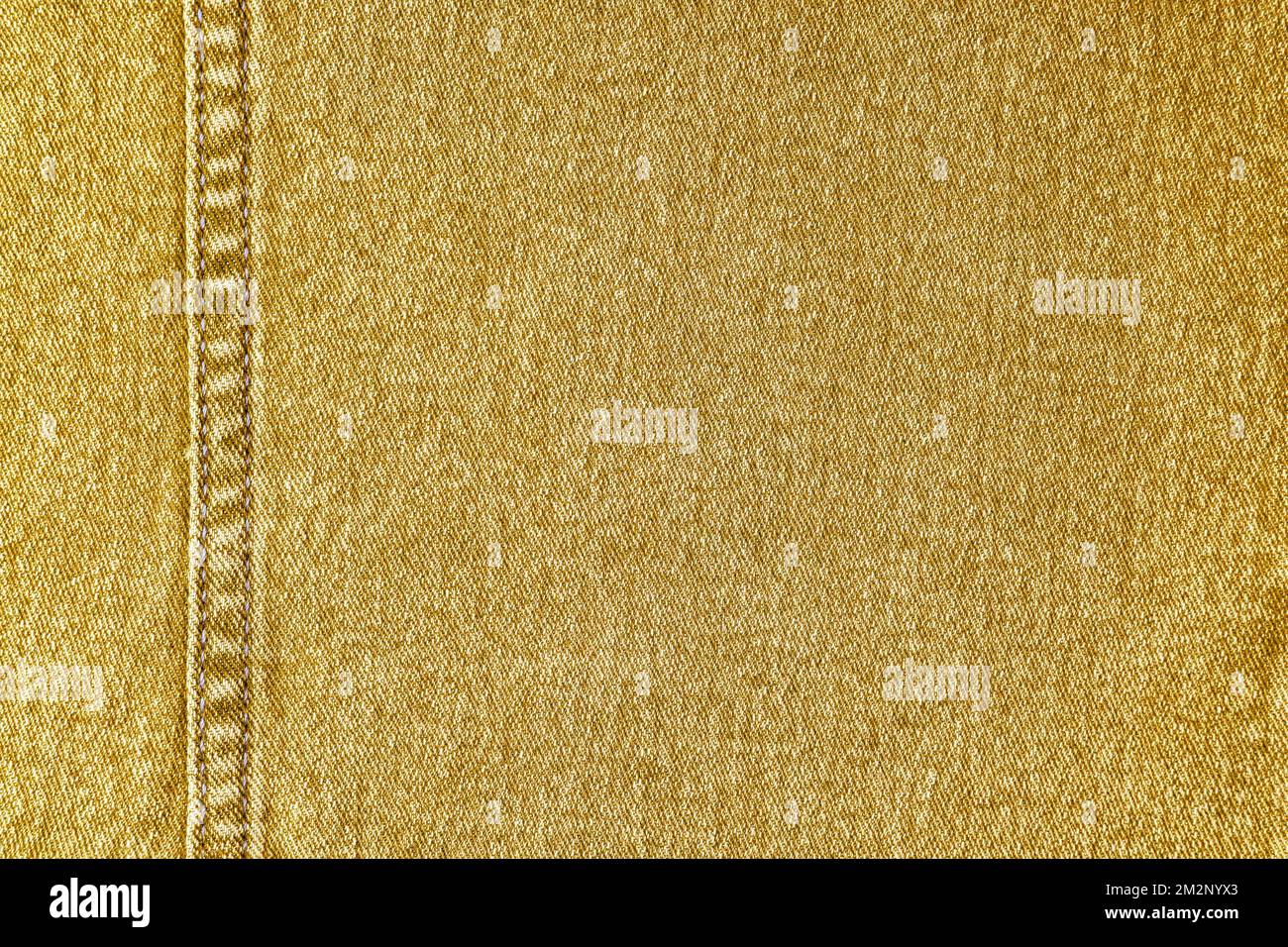 Denim jeans texture background. Texture of yellow colored cotton fabric ...