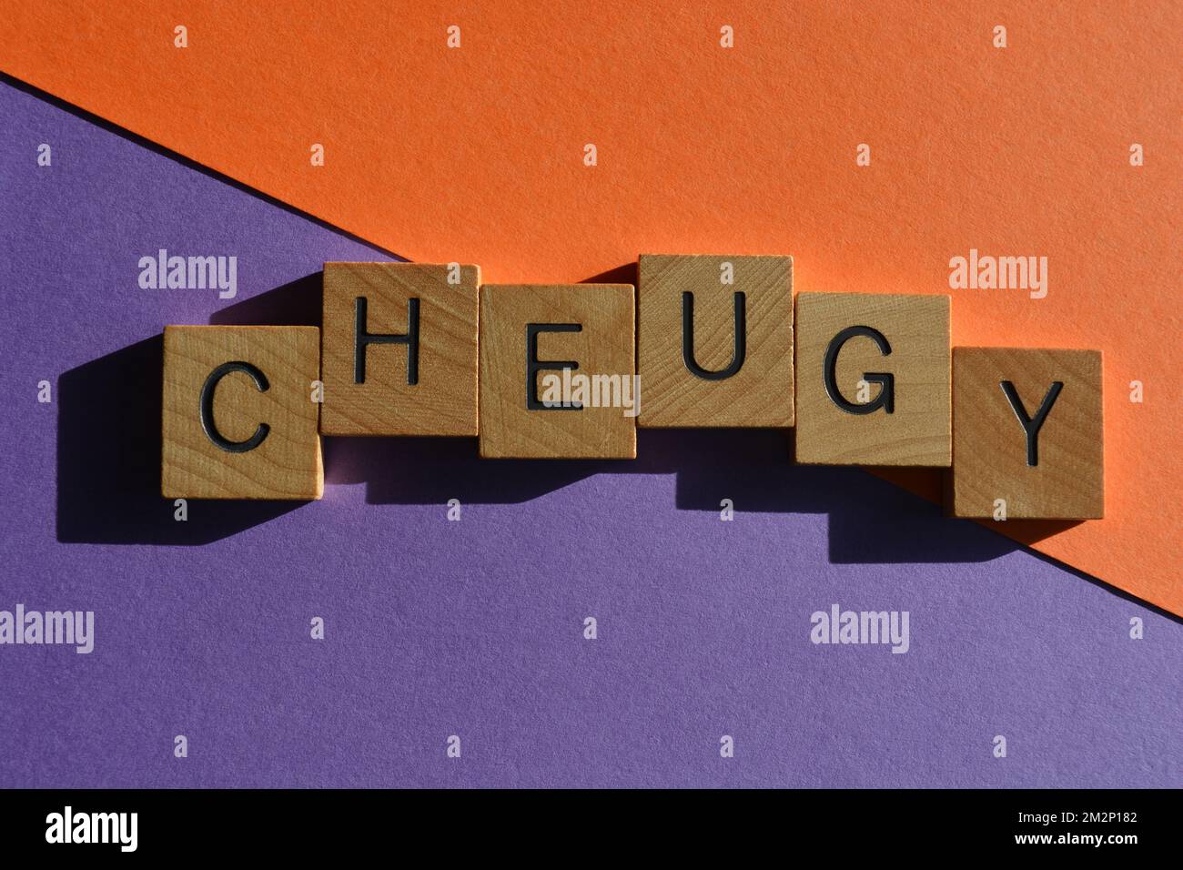 Cheugy, word meaning the opposite of trendy, in wooden alphabet letters ...